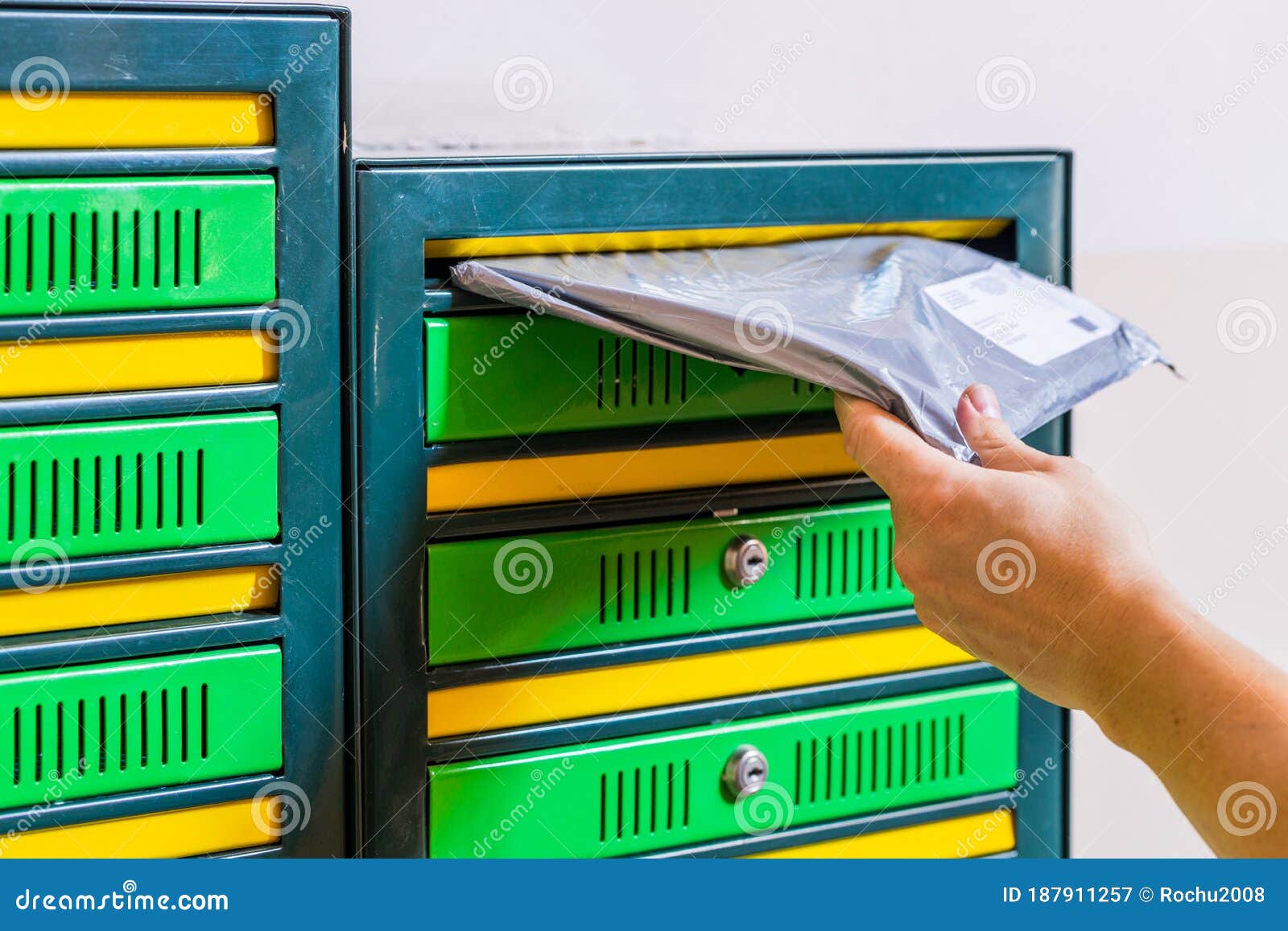 A Postman Throwing Packages into Mailboxes Stock Image - Image of ...