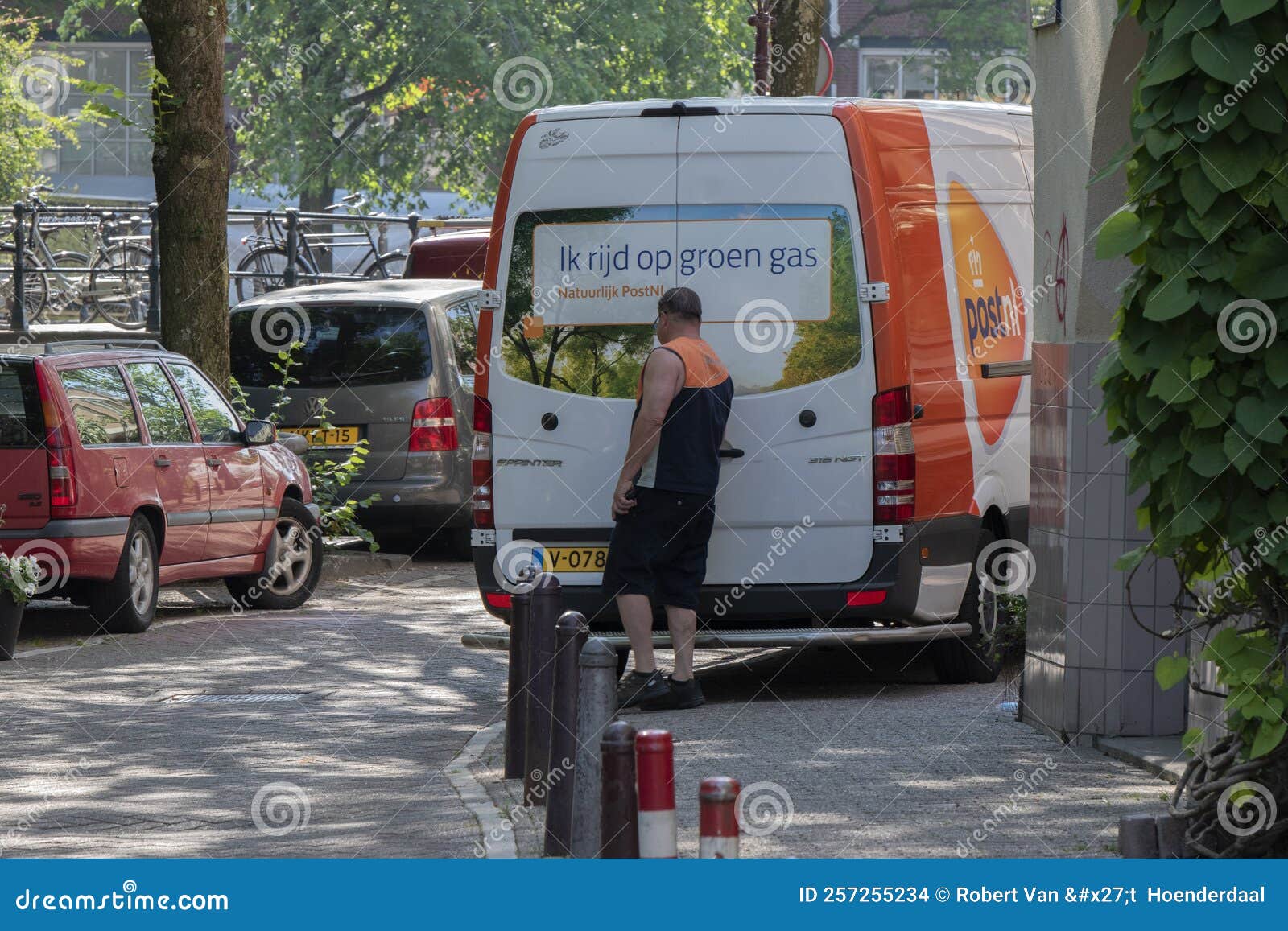 Postman at Work at Amsterdam the Netherlands 23-6-2022 Editorial Stock ...
