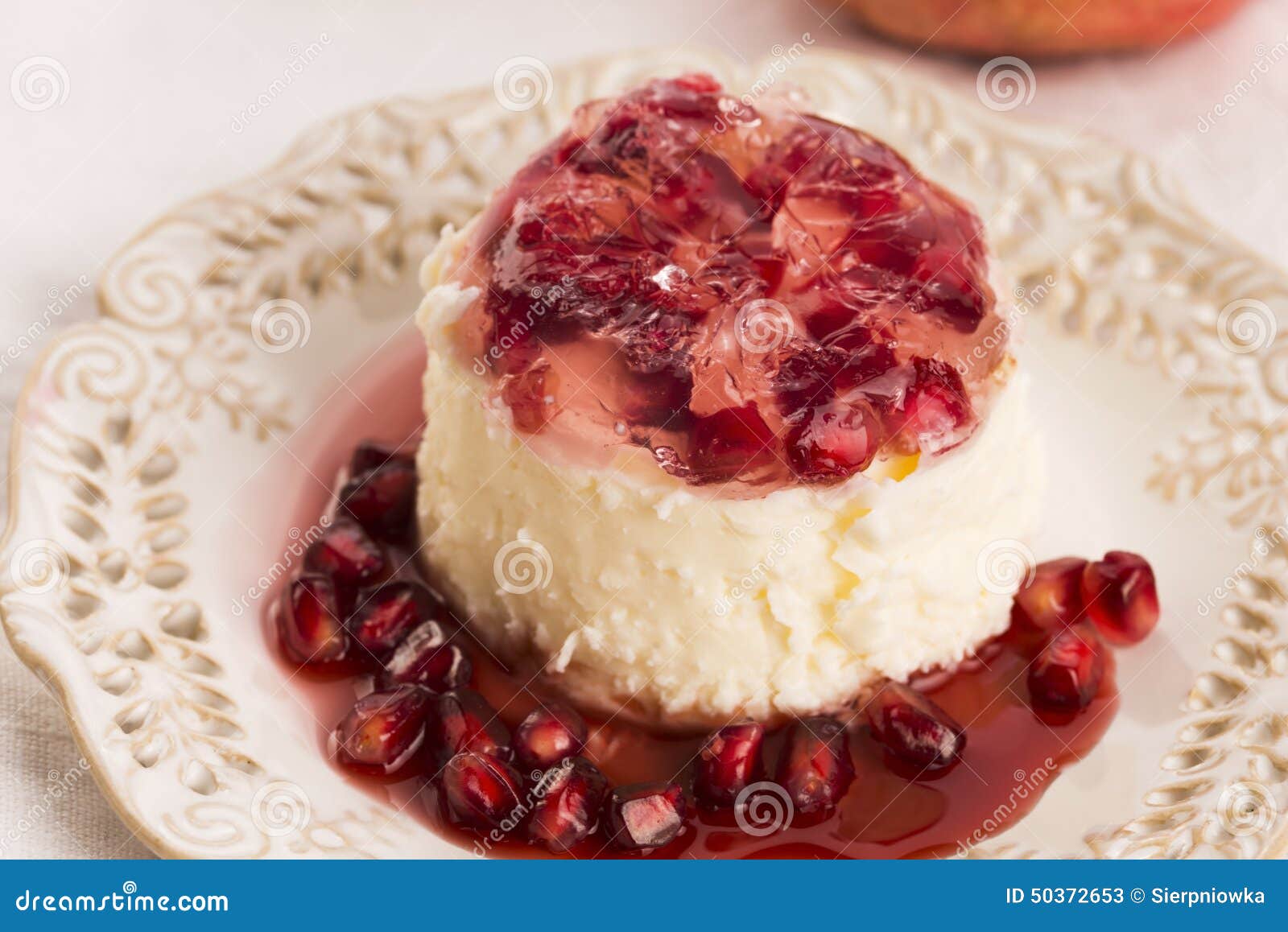 Postre Del Cotta Del Panna Del Coco Con La Granada Imagen de archivo ...
