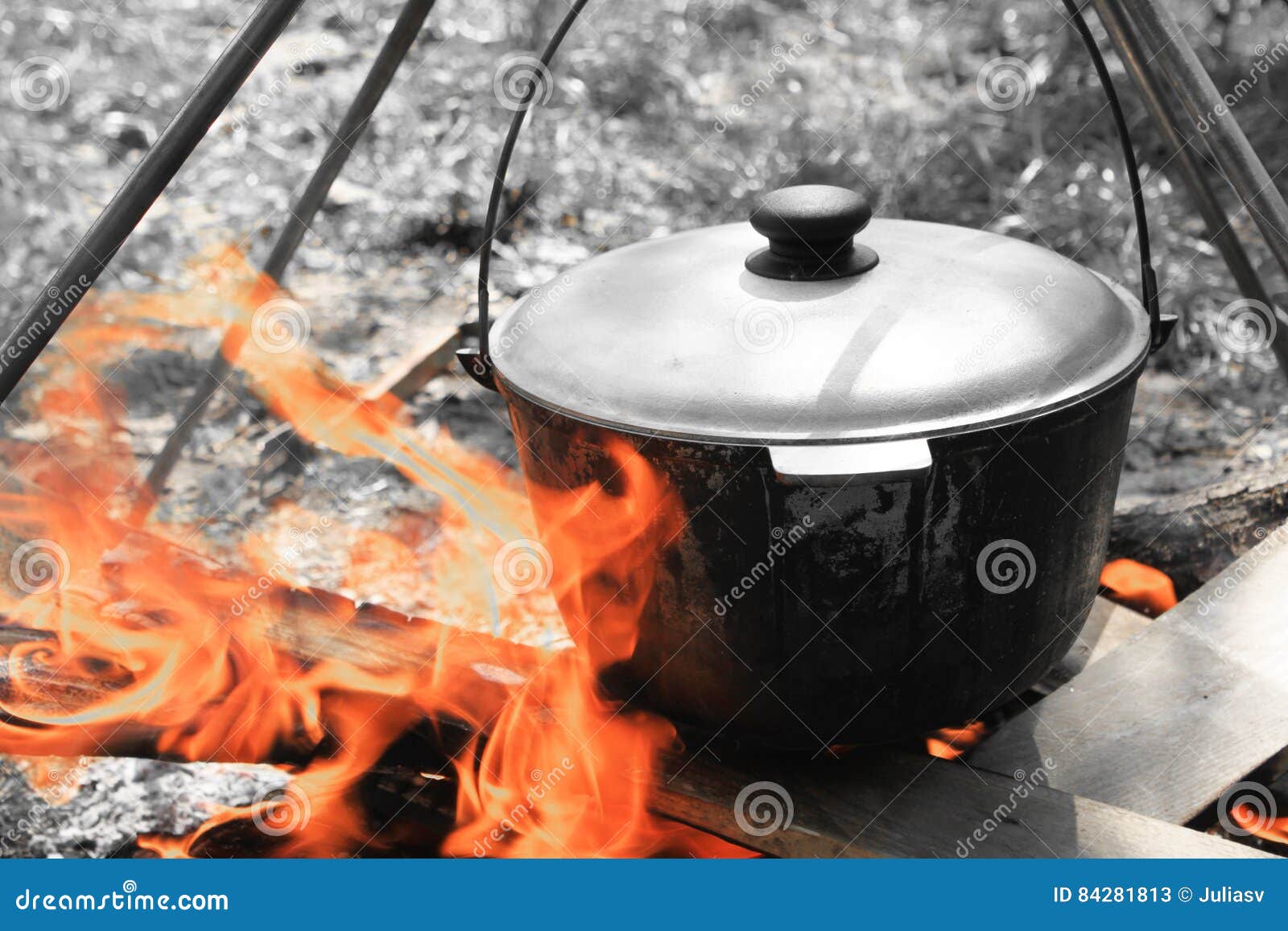 Pot for cooking on a fire stock image. Image of bonfire - 84281813