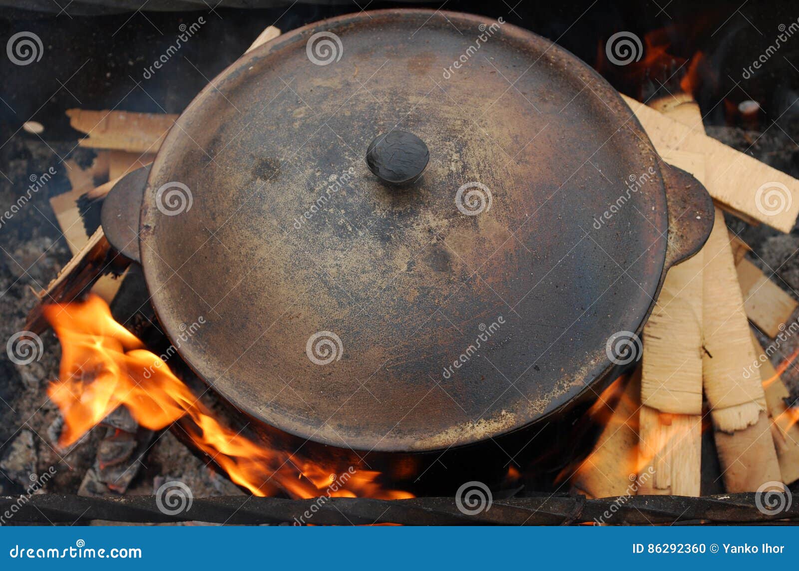 Pot on the fire stock photo. Image of chef, imitate, black - 86292360