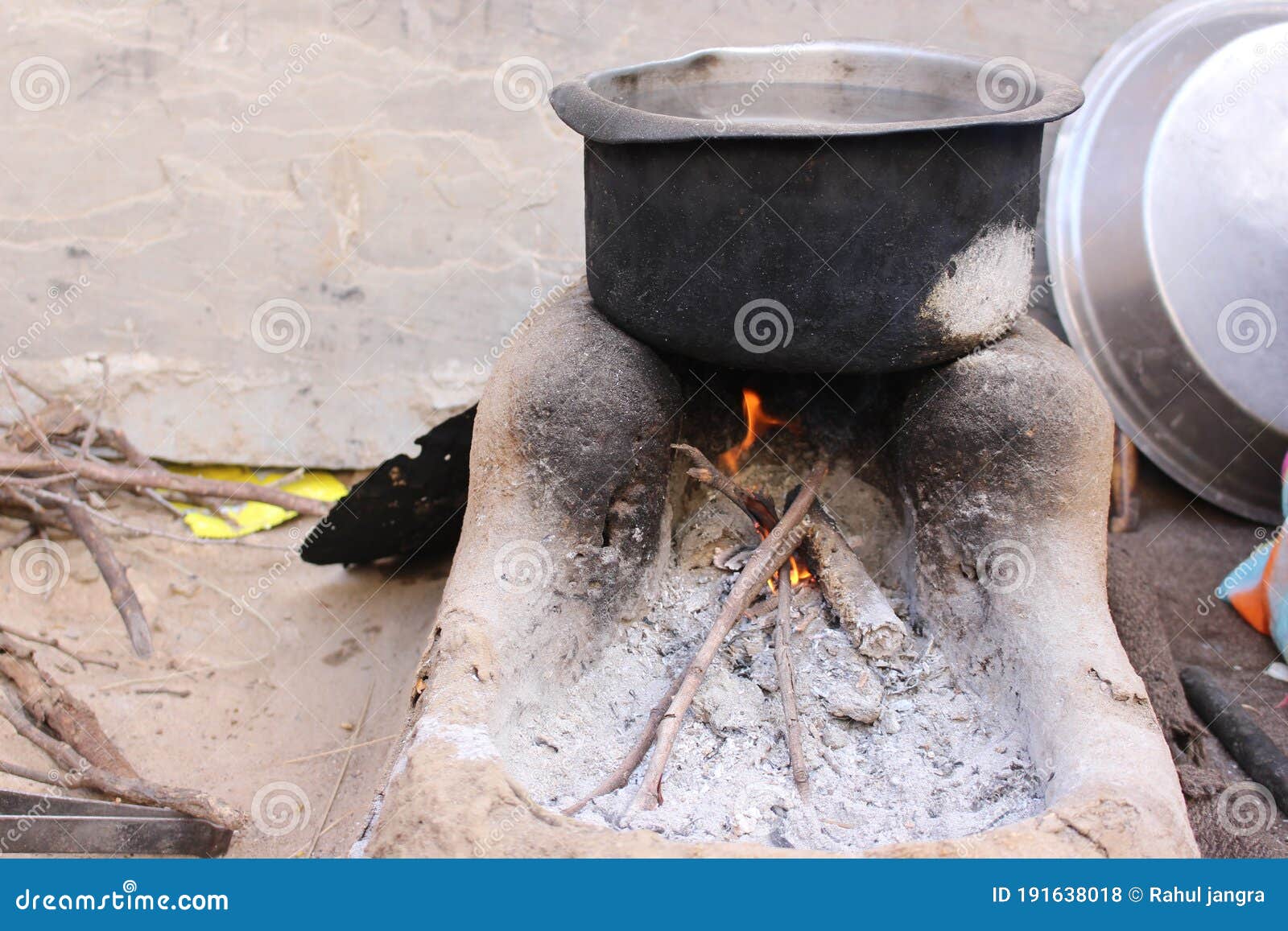A pot that is on fire stock photo. Image of board, cooking - 191638018