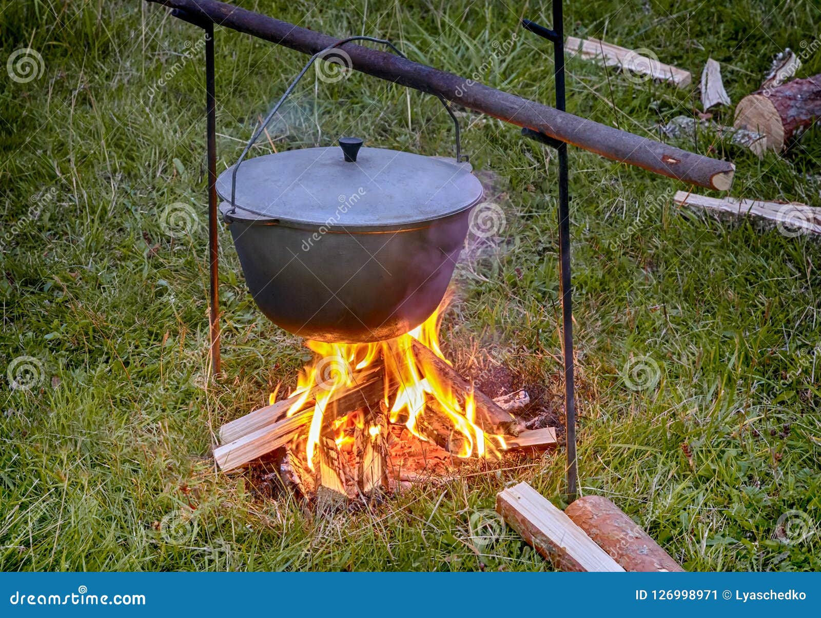 In the Pot on the Fire Preparing Food. Stock Image - Image of adventure ...
