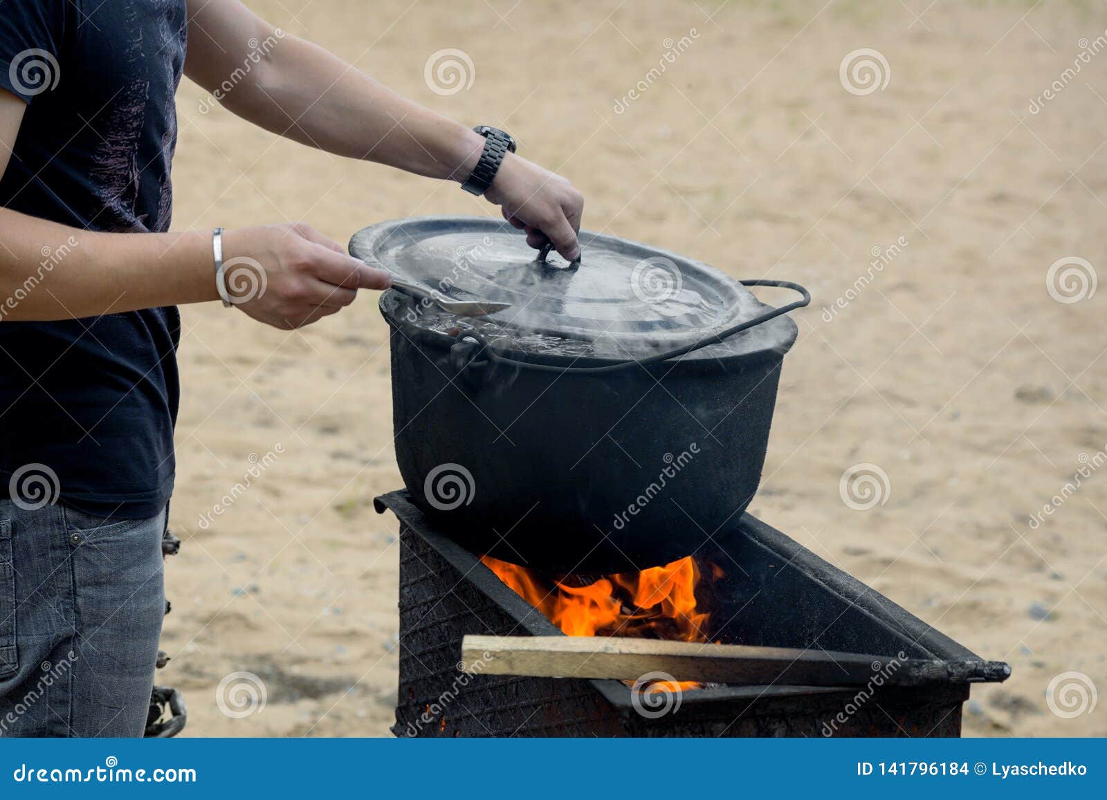 In the Pot on the Fire Preparing Food Stock Photo - Image of burn ...