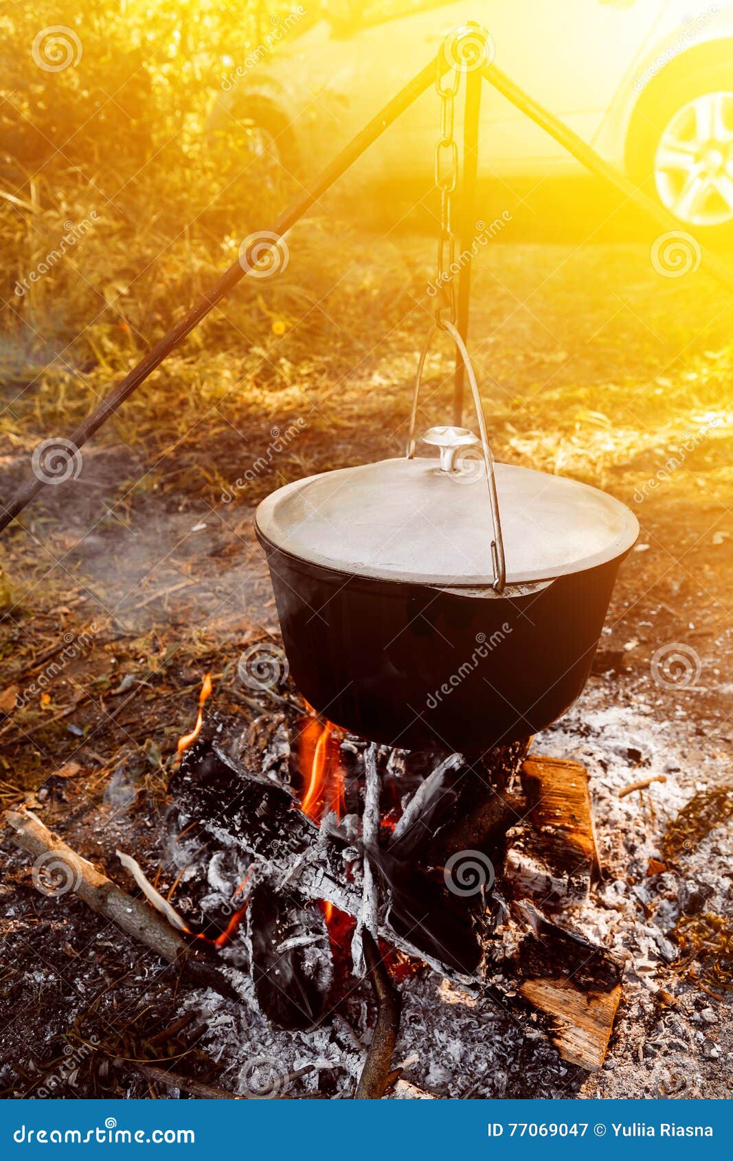 A Pot Hanging on a Tripod Over the Fire Stock Image - Image of tripod ...
