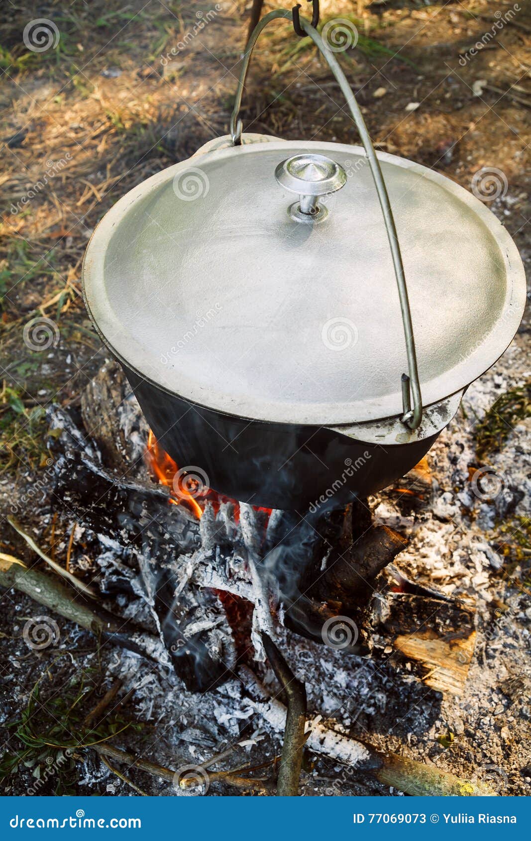 A Pot Hanging on a Tripod Over the Fire Stock Image - Image of camp ...