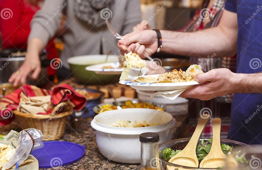 Pot Luck Dinner stock image. Image of potluck, food, people - 39327517