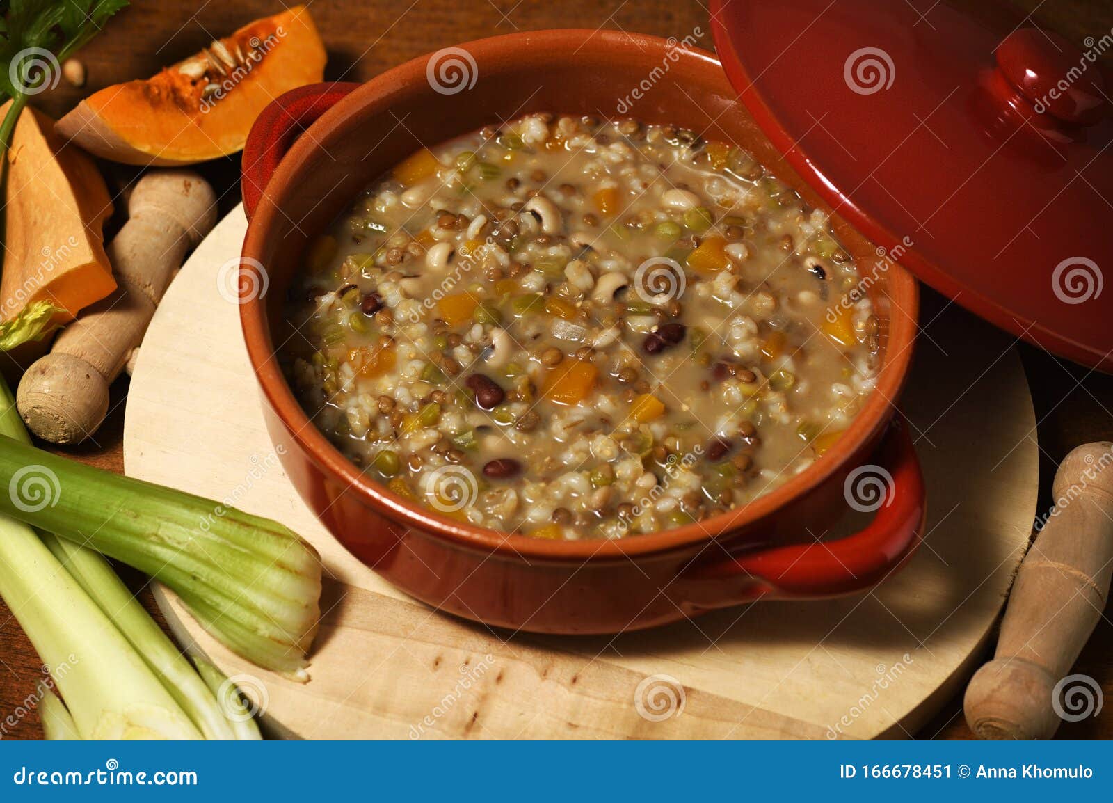Pot with soup of legumes stock image. Image of close - 166678451