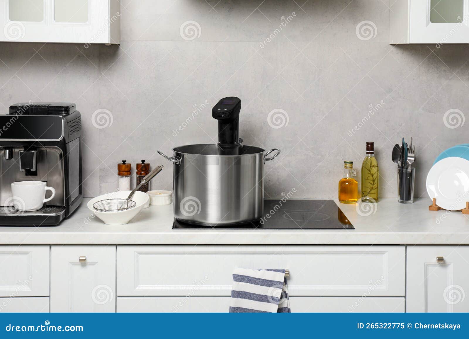 Pot with Sous Vide Cooker in Kitchen. Thermal Immersion Circulator ...