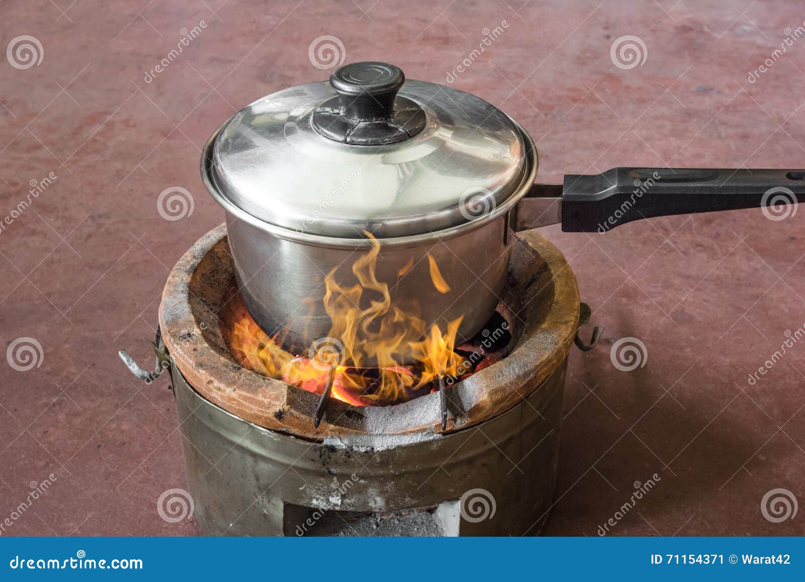 Pot on stove with flame stock image. Image of flare, burn - 71154371