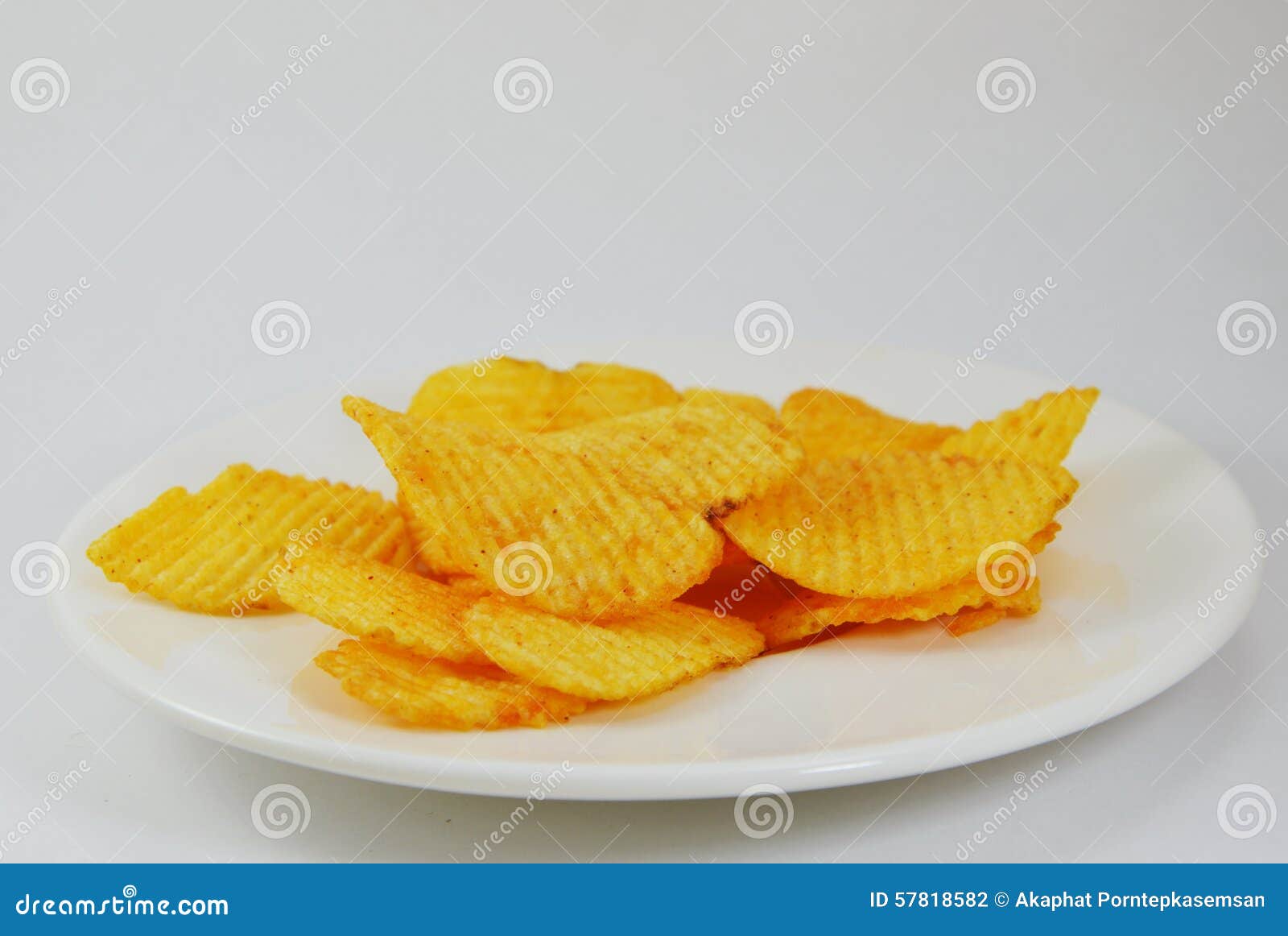 Potato chip on dish stock photo. Image of food, fried - 57818582