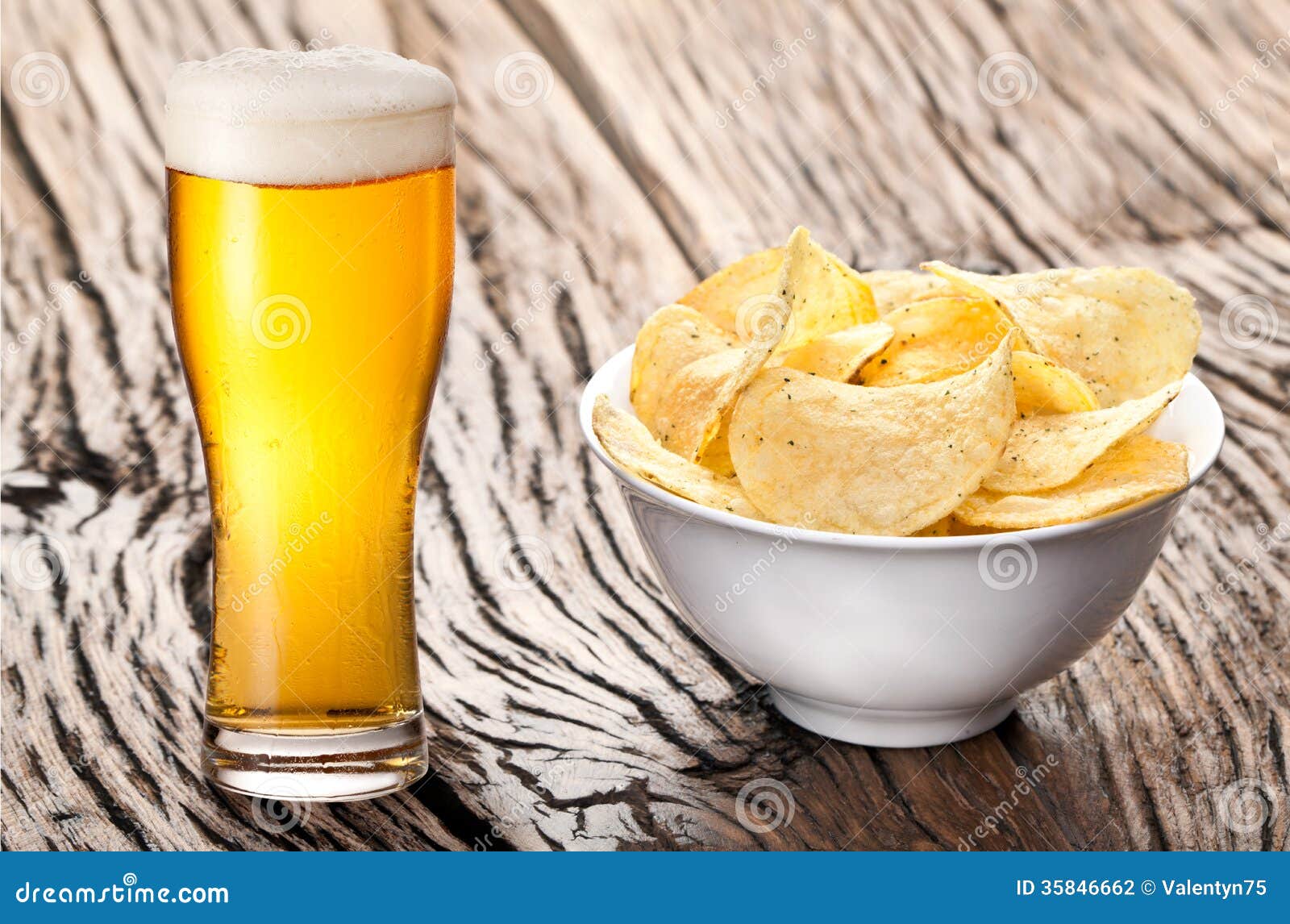 Potato chips and beer. stock photo. Image of alcohol - 35846662