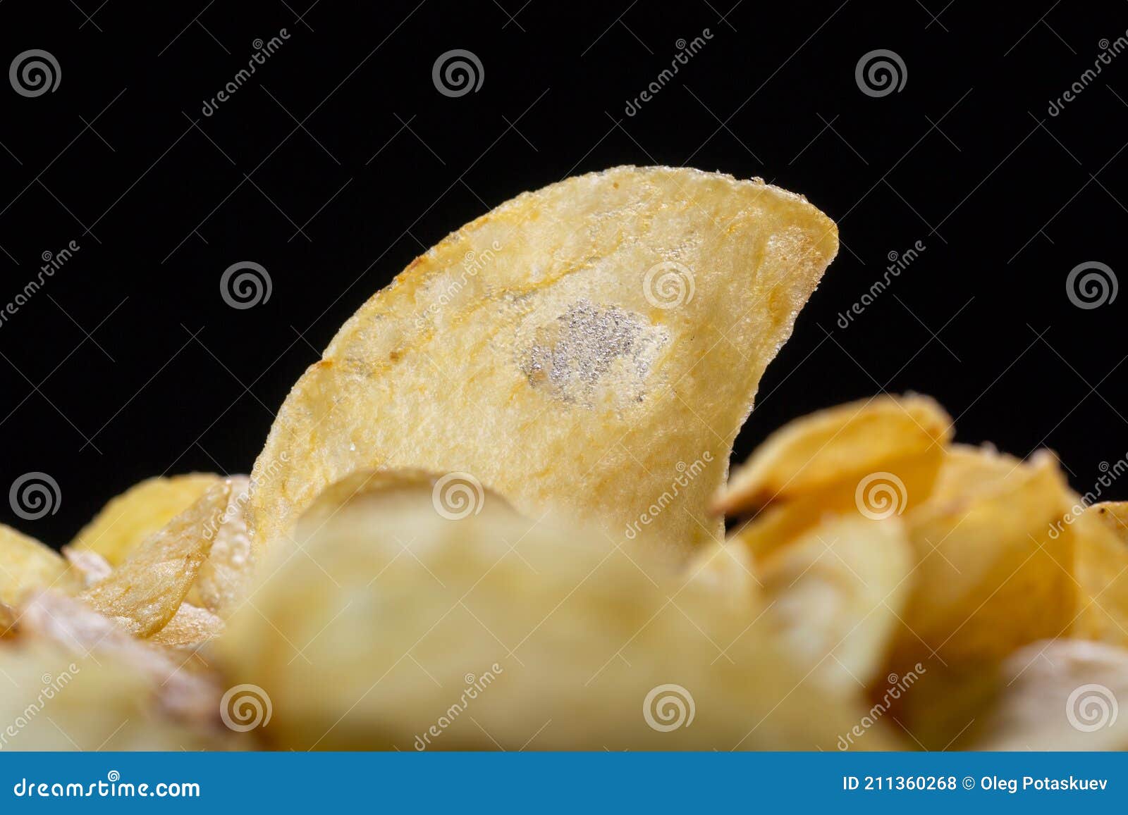 Potato Chips on a Black Background Close-up. Stock Photo - Image of ...