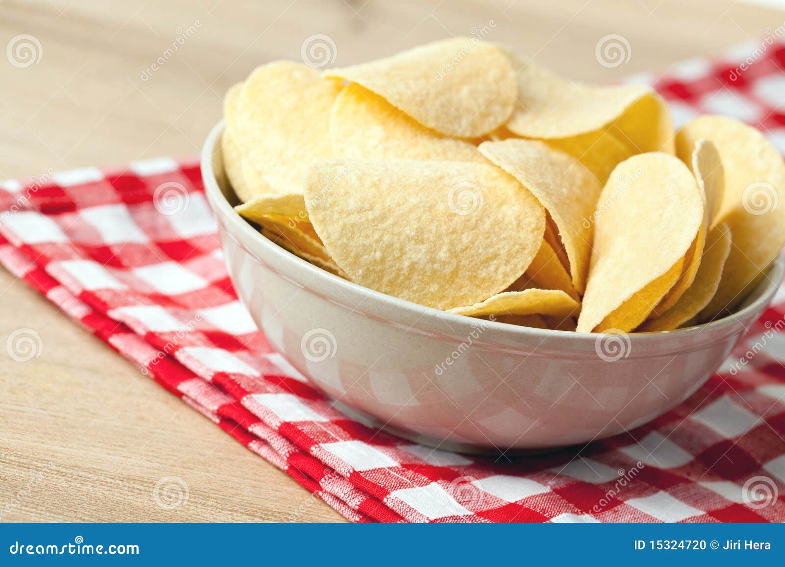 Potato chips in bowl stock photo. Image of slice, junk - 15324720