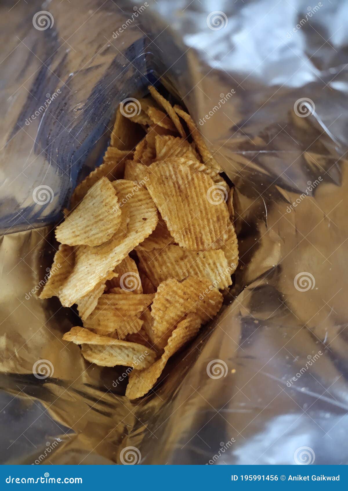 Potato chips inside packet stock photo. Image of meat - 195991456