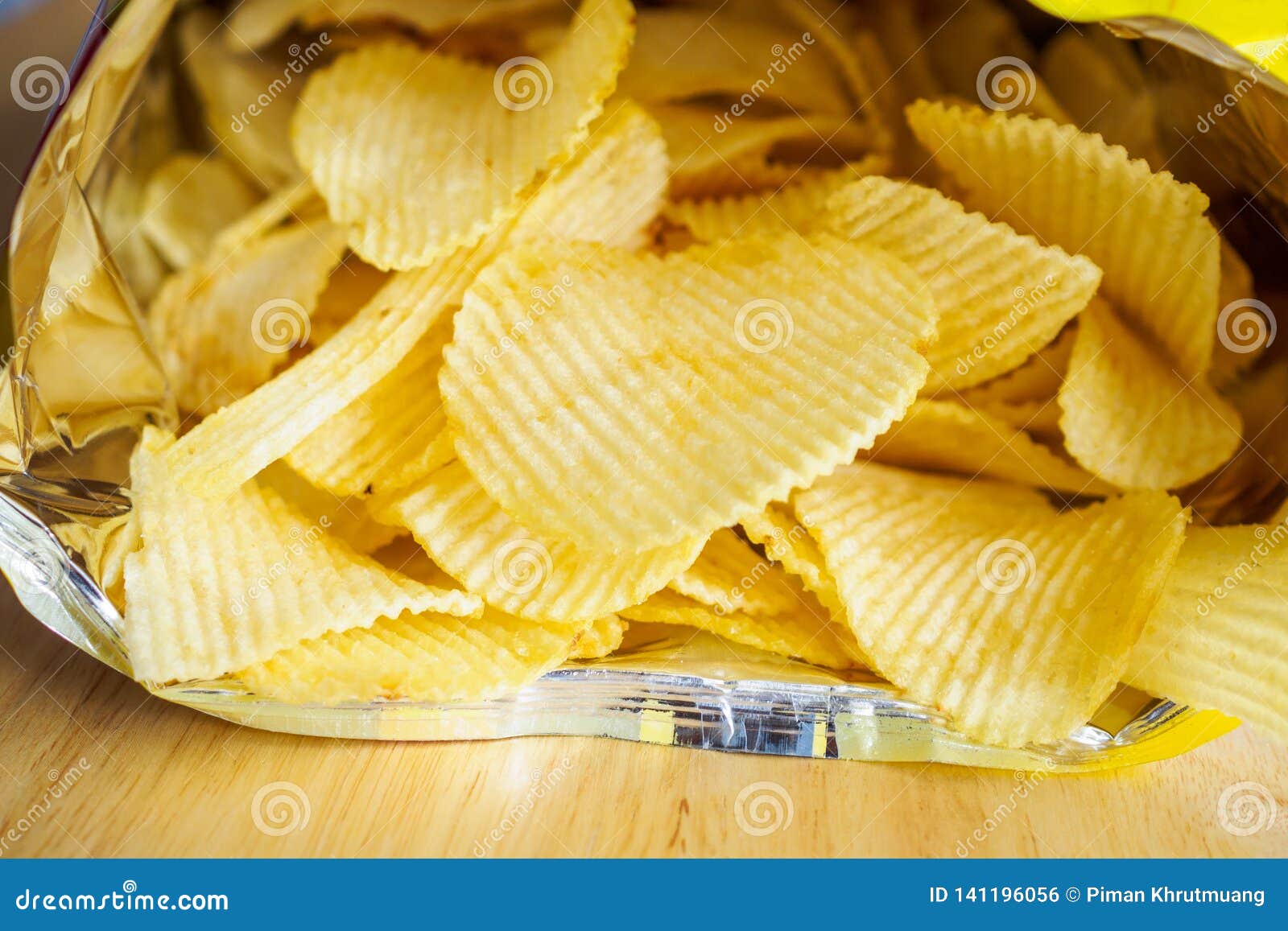 Potato Chips Open Bag on Wood Table Stock Photo - Image of junk, crisps ...