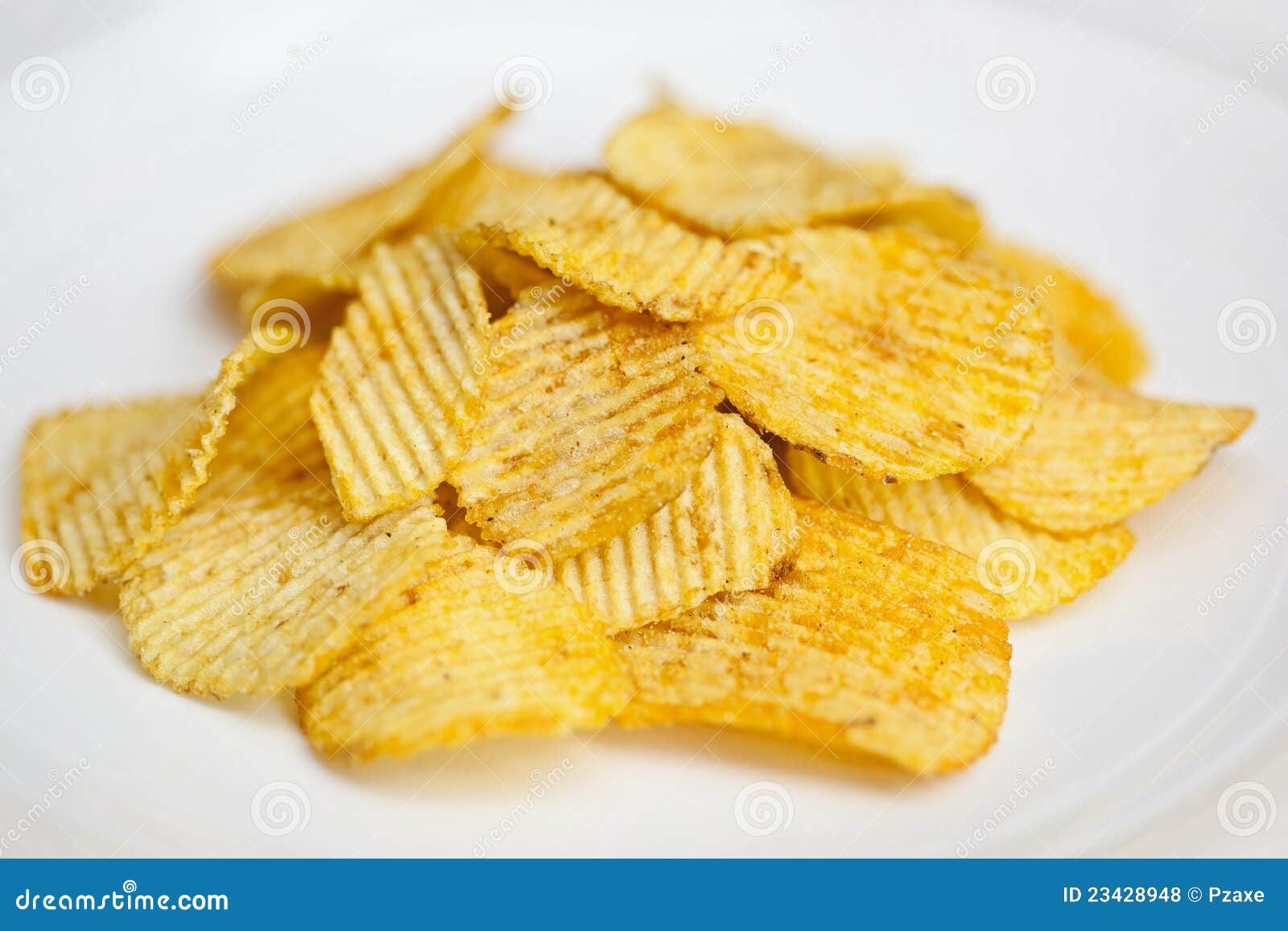 Potato chips on a plate stock photo. Image of pile, deep - 23428948