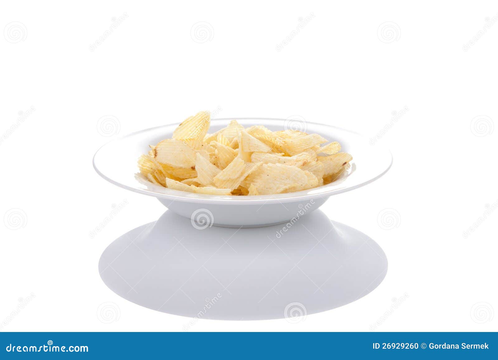 Potato chips on a plate stock photo. Image of nourishment - 26929260