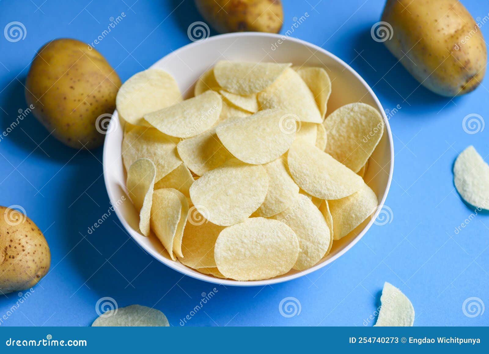 Potato Chips Snack on Bowl, Crispy Potato Chips on the Kitchen Table ...