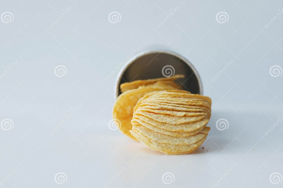 Potato Chips Spilling Form a Packet on Table Stock Image - Image of ...