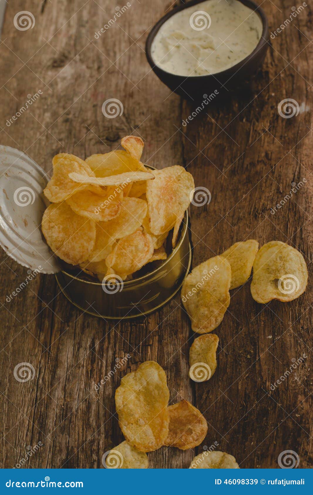 Potato chips on the table stock image. Image of crispy - 46098339