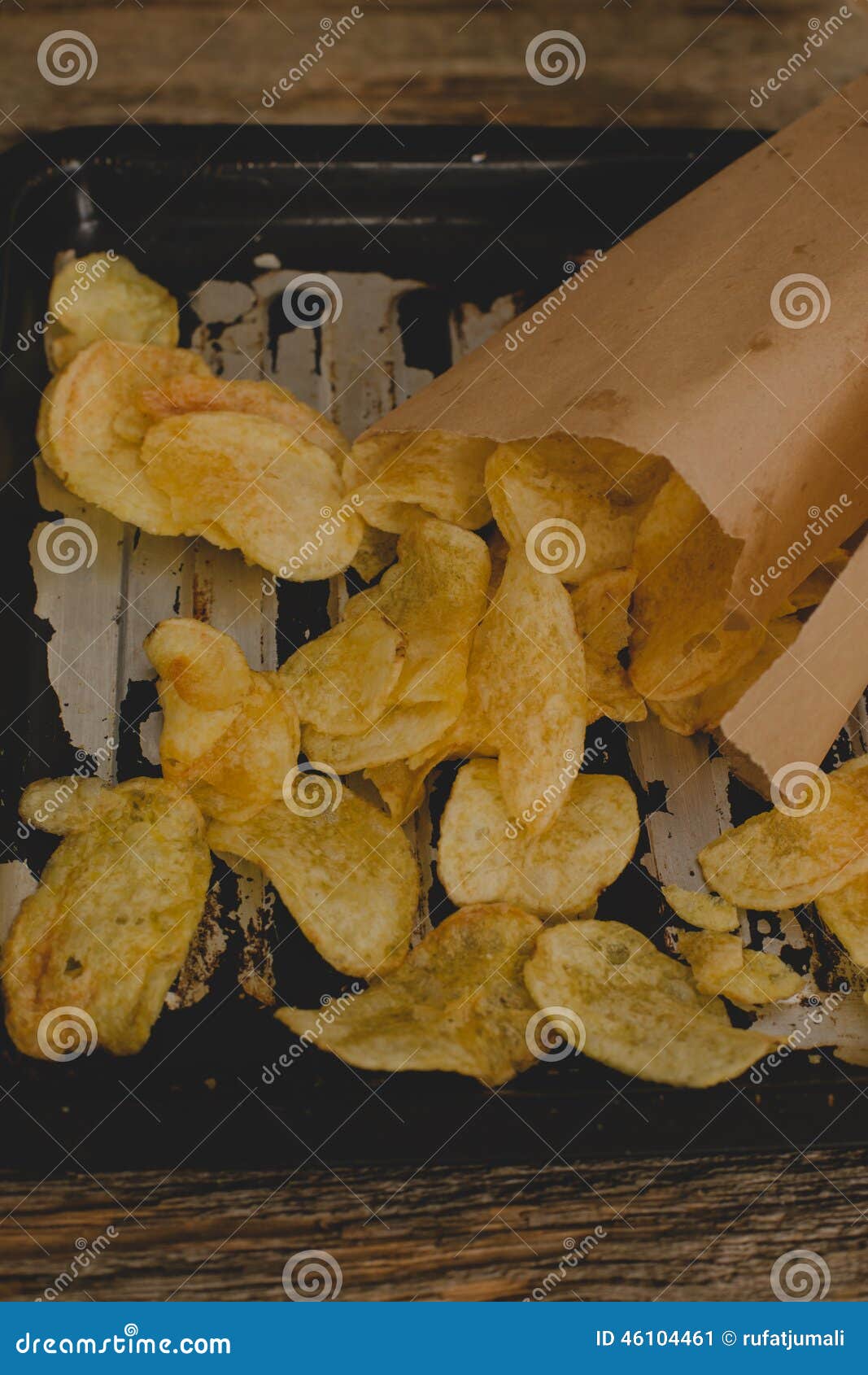 Potato chips on the table stock image. Image of crispy - 46104461
