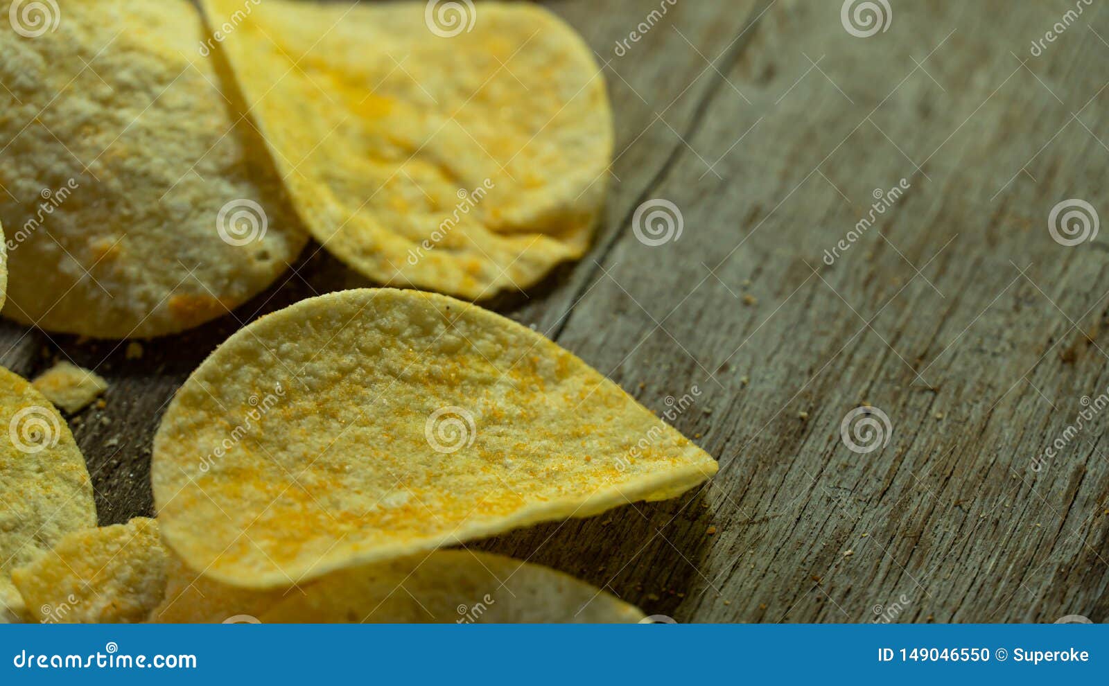 Potato chips on the table stock photo. Image of party - 149046550