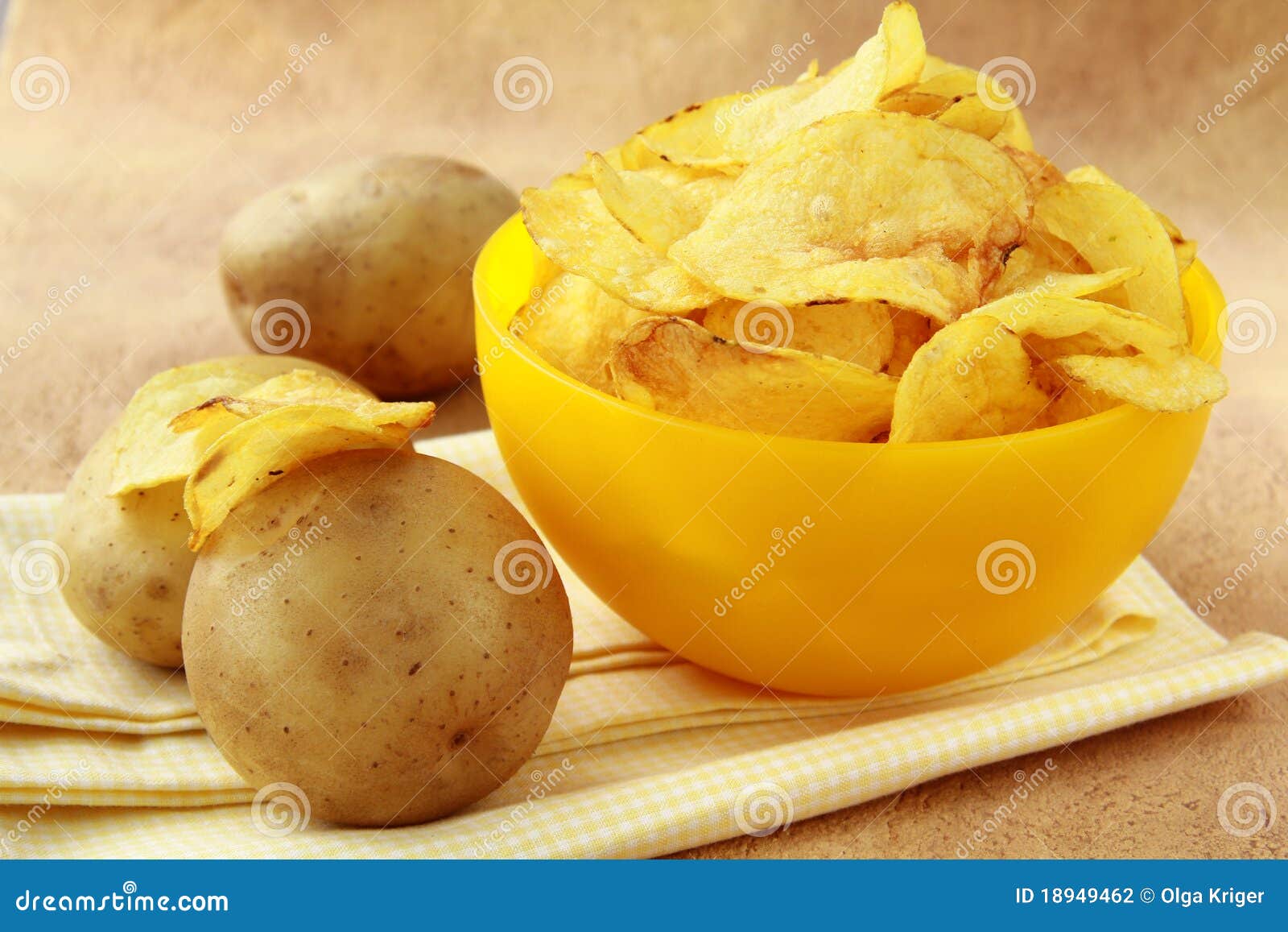 Potato Chips in a Yellow Cup, and Potato Stock Photo - Image of heap ...