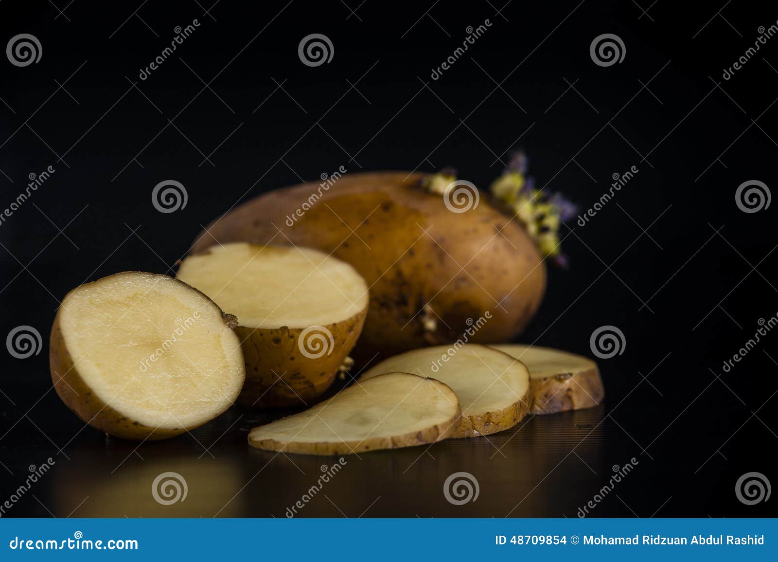 Potato in dark on black stock photo. Image of fresh, potatoes - 48709854