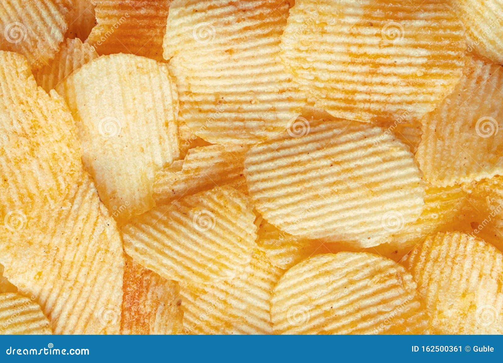 Potato Fluted Chips Close-up. Background of Corrugated Chips Top View ...