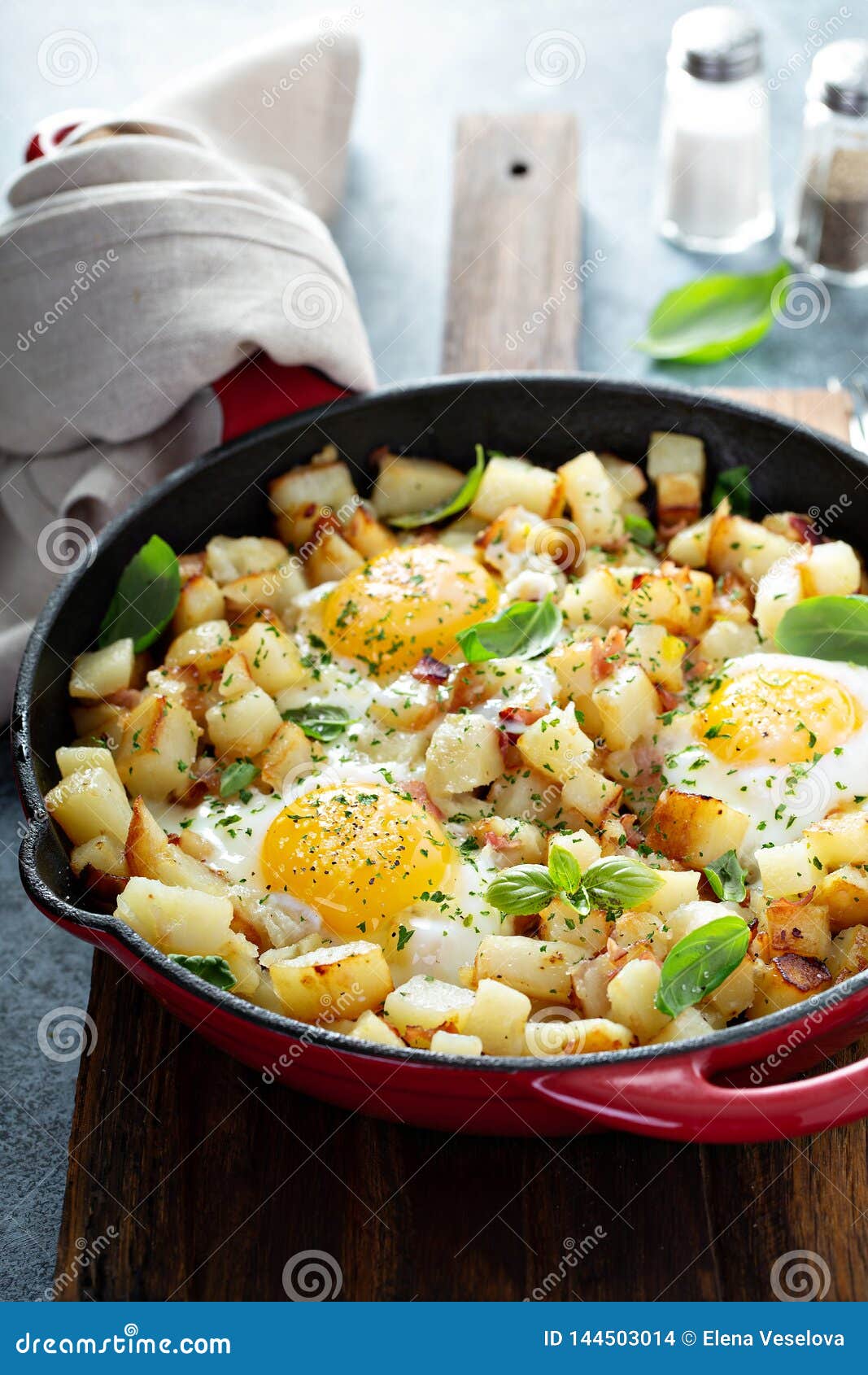 Potato Hash with Ham and Eggs Stock Photo - Image of board, eggs: 144503014