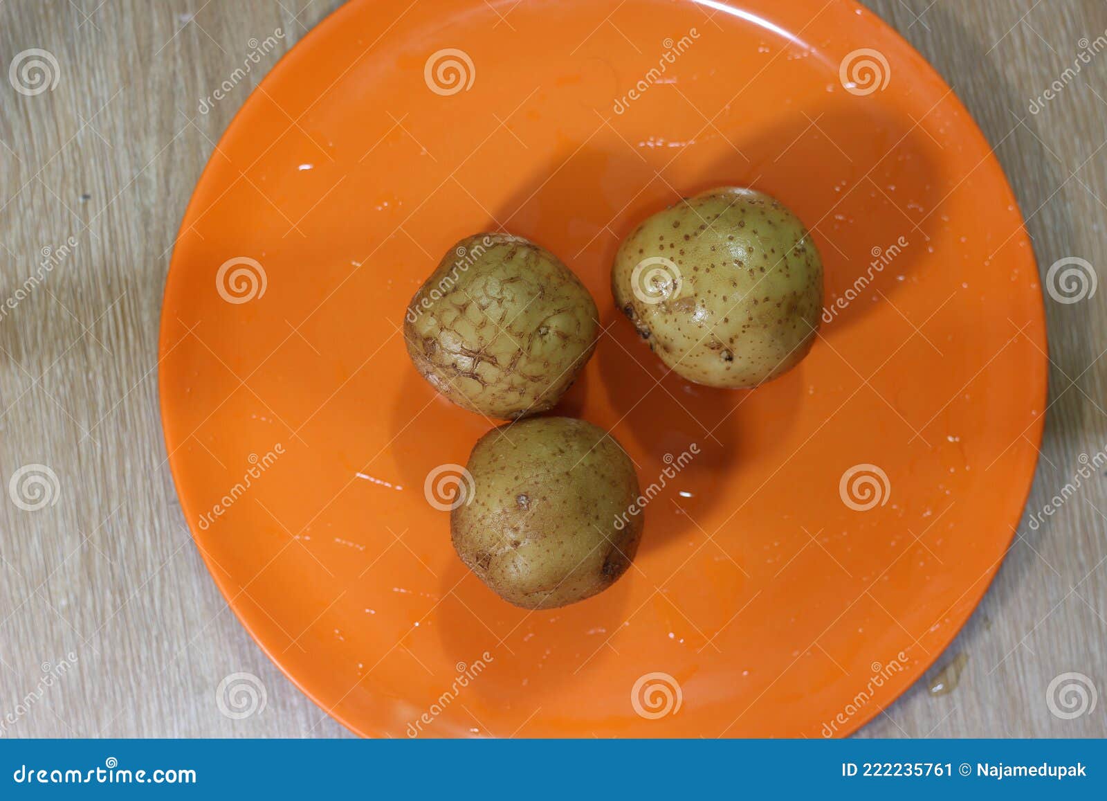 Potato on a Orange Color Cutting Board Stock Image - Image of brown ...