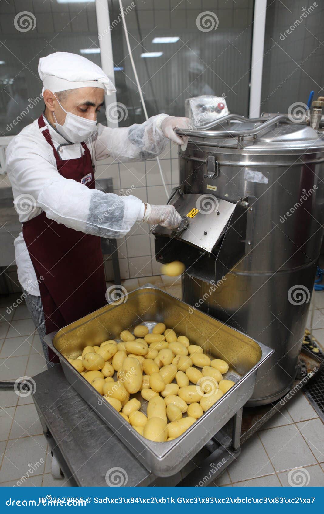 Potato peeling machine. editorial image. Image of peel - 23628955
