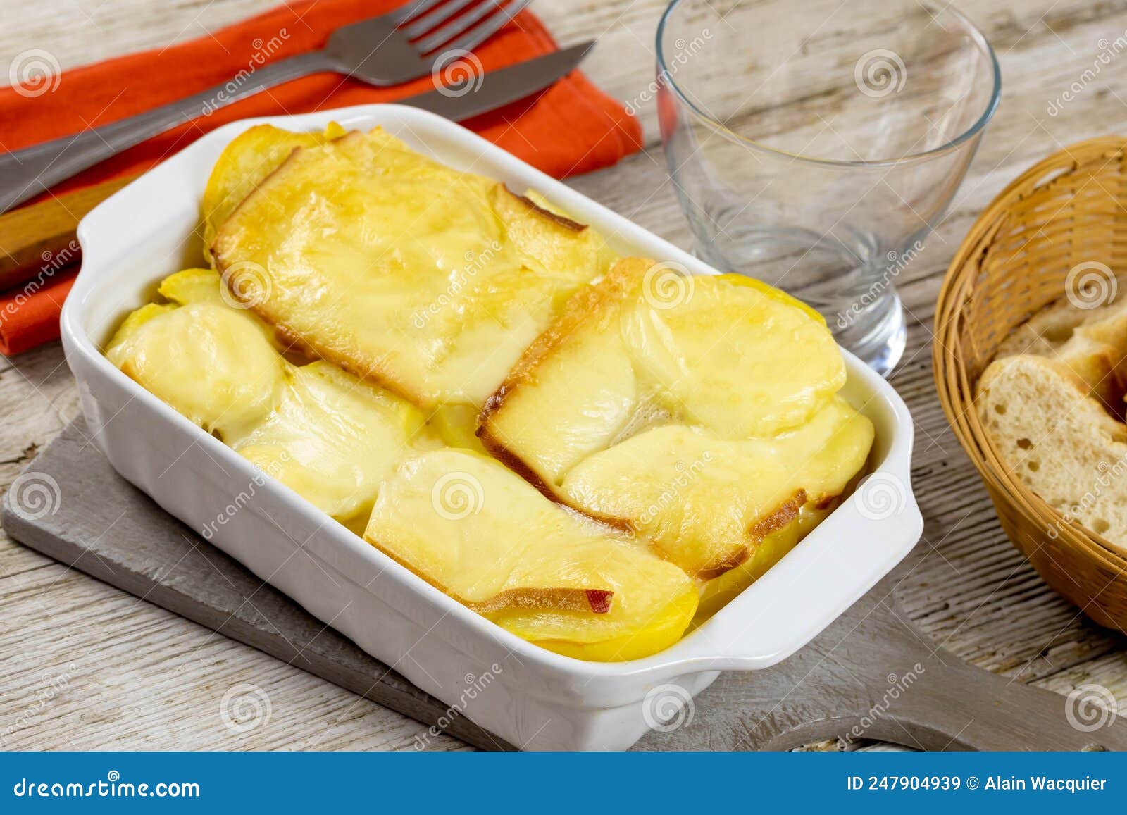 Potato with Raclette Cheese on Wooden Table Stock Image - Image of ...