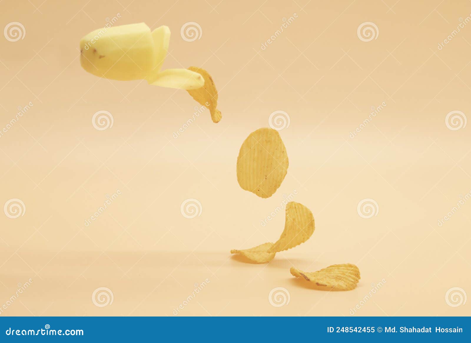 Potato Slices Falling and Turning into Chips Isolated on Colorful ...