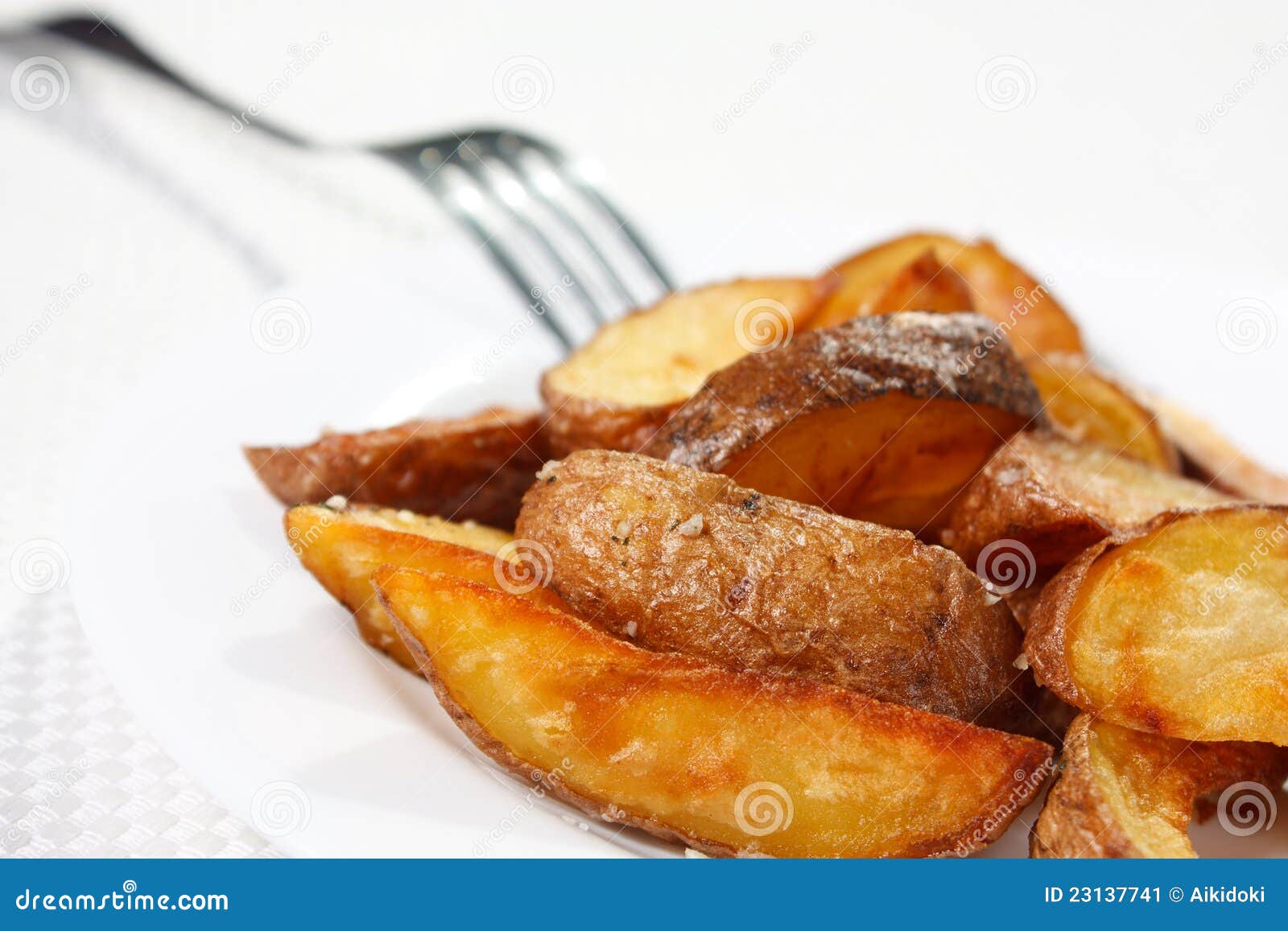 Potato Wedges Roasted in Their Skins on a Plate Stock Image - Image of ...