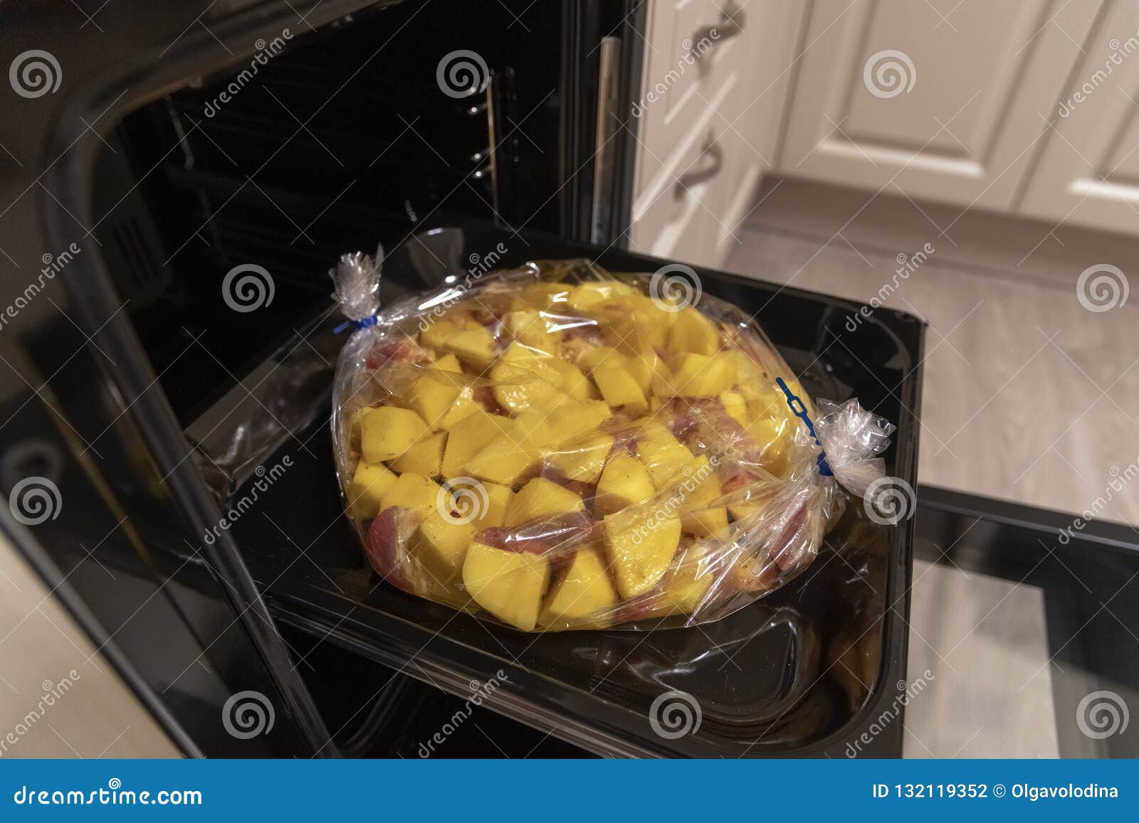 Potatoes and Chunks of Meat in Sleeve for Baking Stock Photo - Image of ...