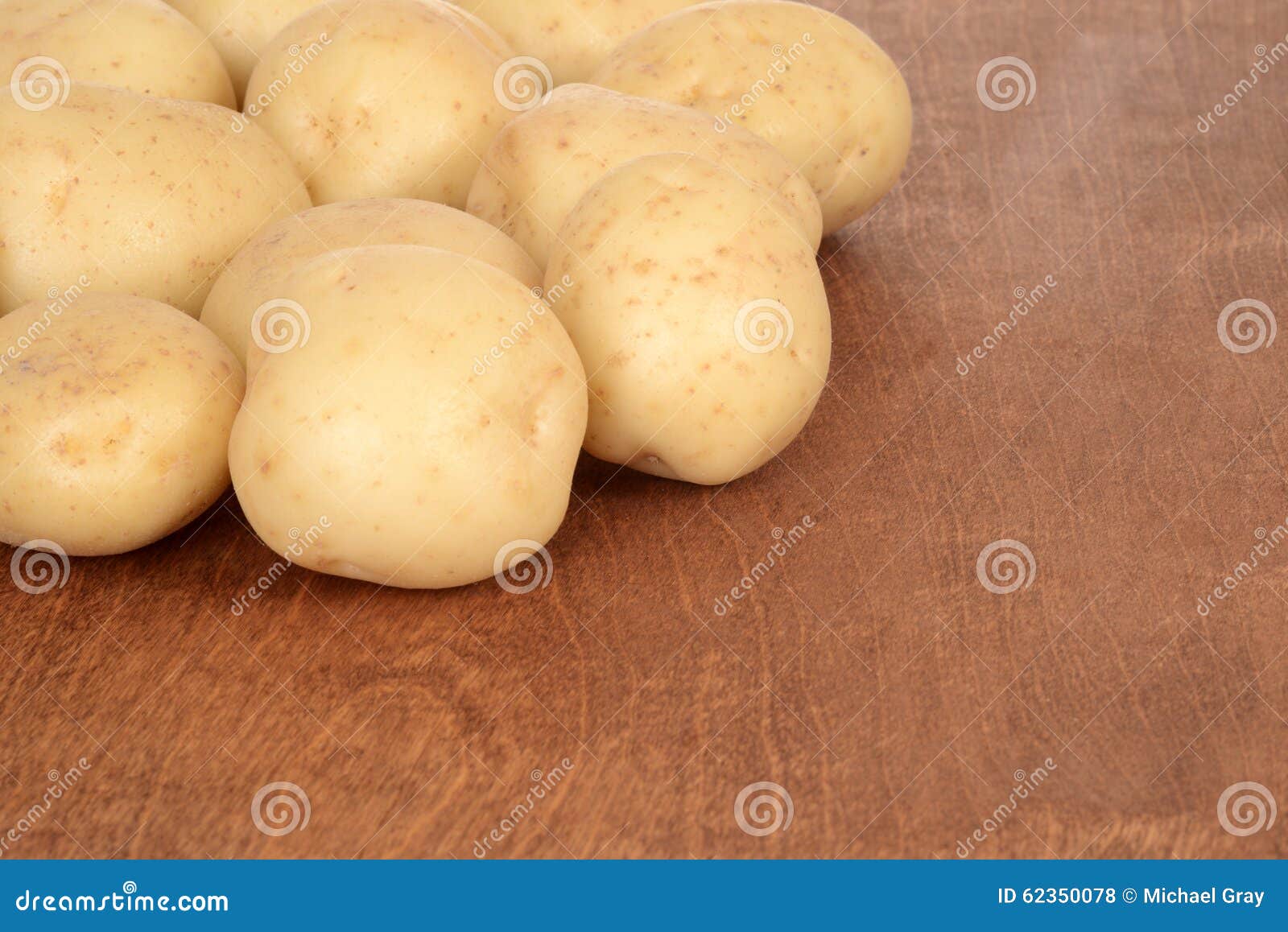 Potatoes on wood stock photo. Image of closeup, spuds - 62350078