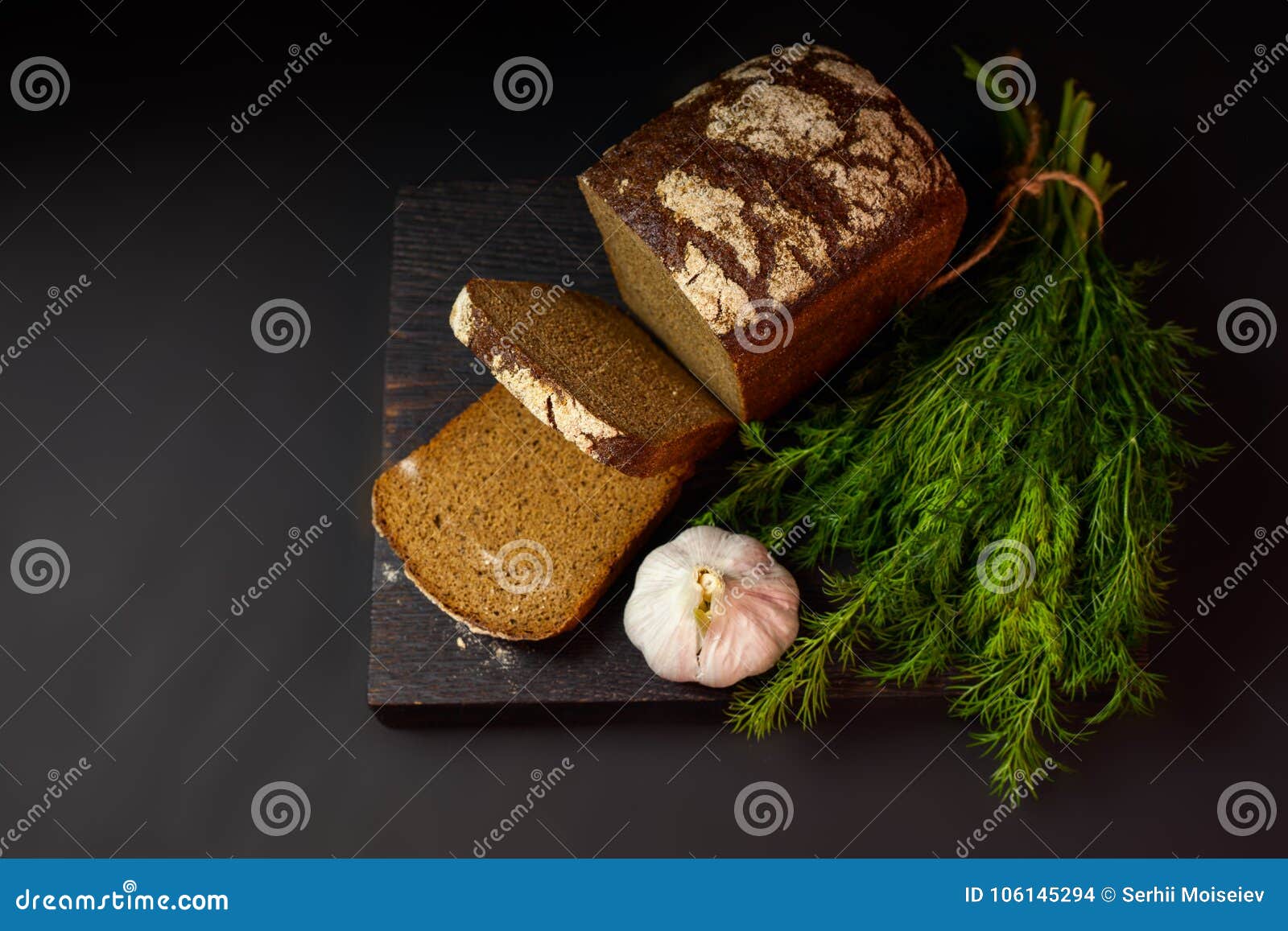 Bread on a dark background stock photo. Image of fresh - 106145294