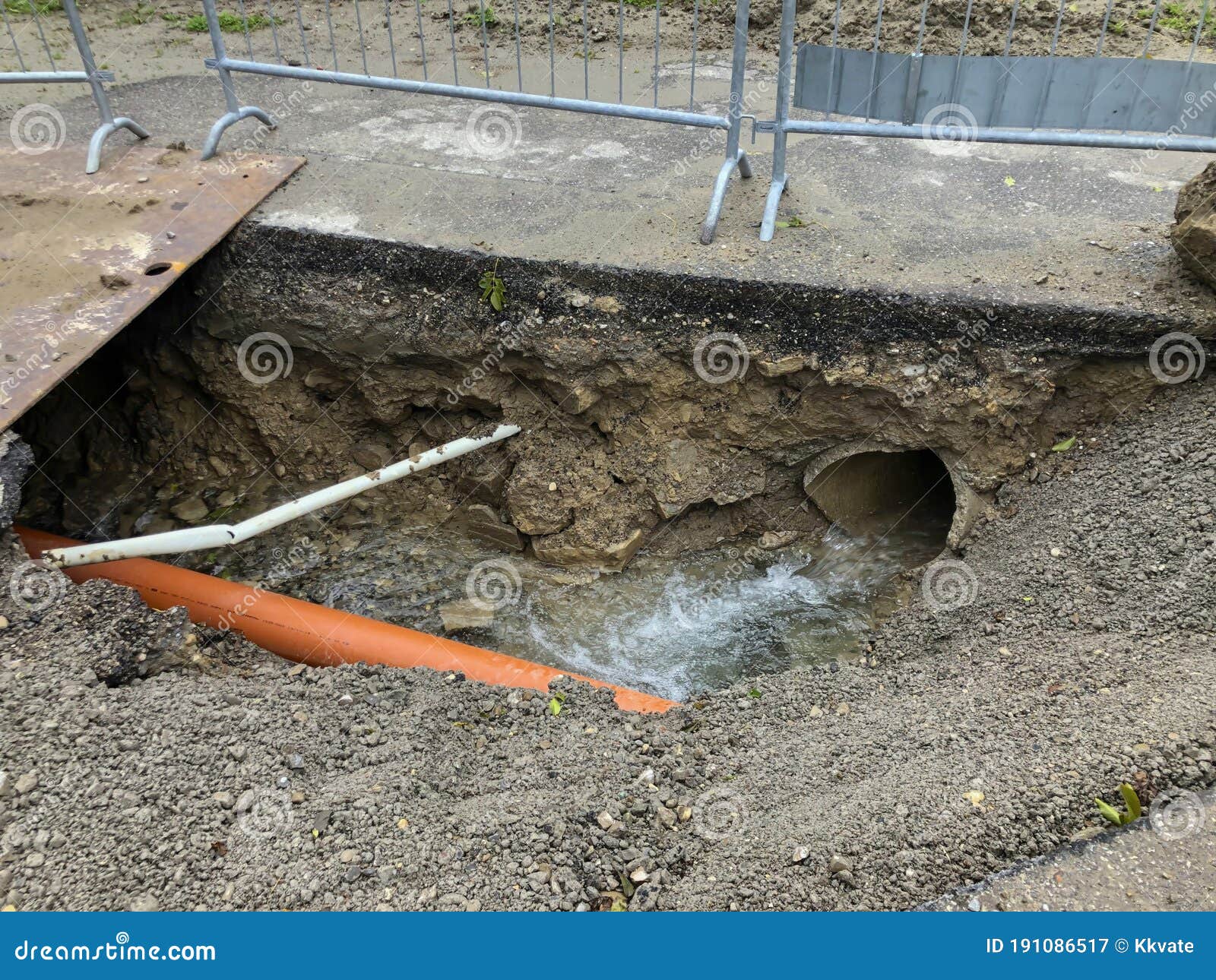 A Pothole on the Asphalt Road. Construction in Process. Road Closed ...