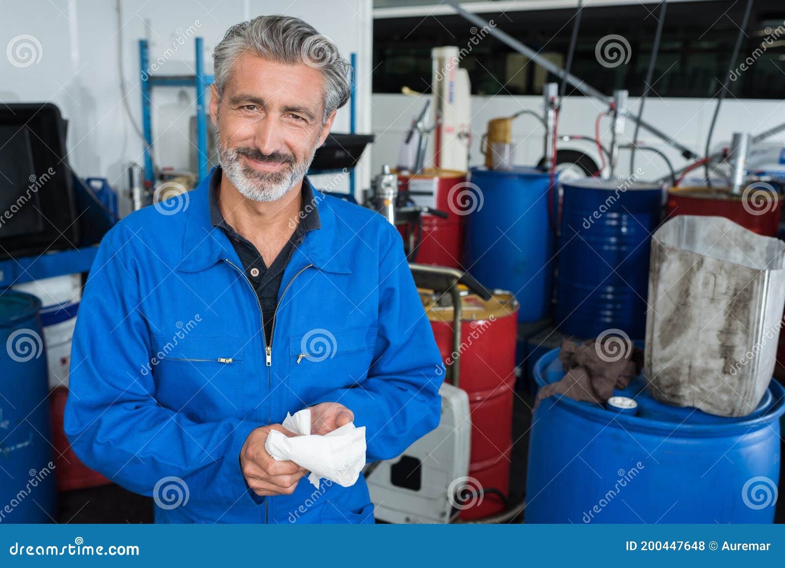 Potrait happy mechanic man stock photo. Image of attractive - 200447648