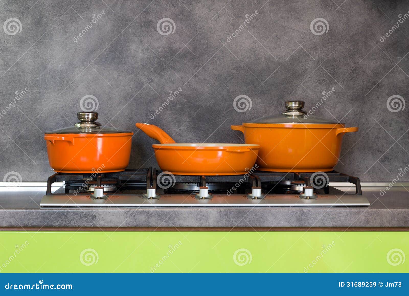 Pots and pan on the stove stock image. Image of steel - 31689259