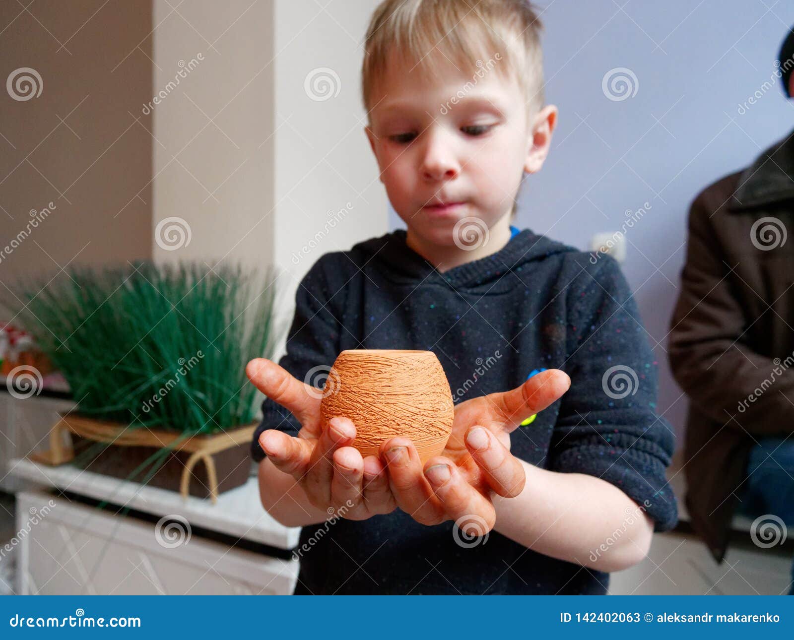 Potter Boy Proudly Holding a Clay Pot Stock Image - Image of novice ...