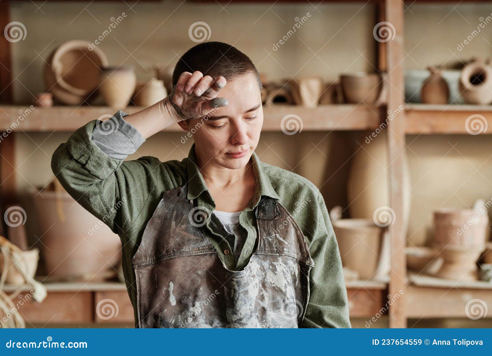 Potter Having a Lot of Work in Workshop Stock Image - Image of ...