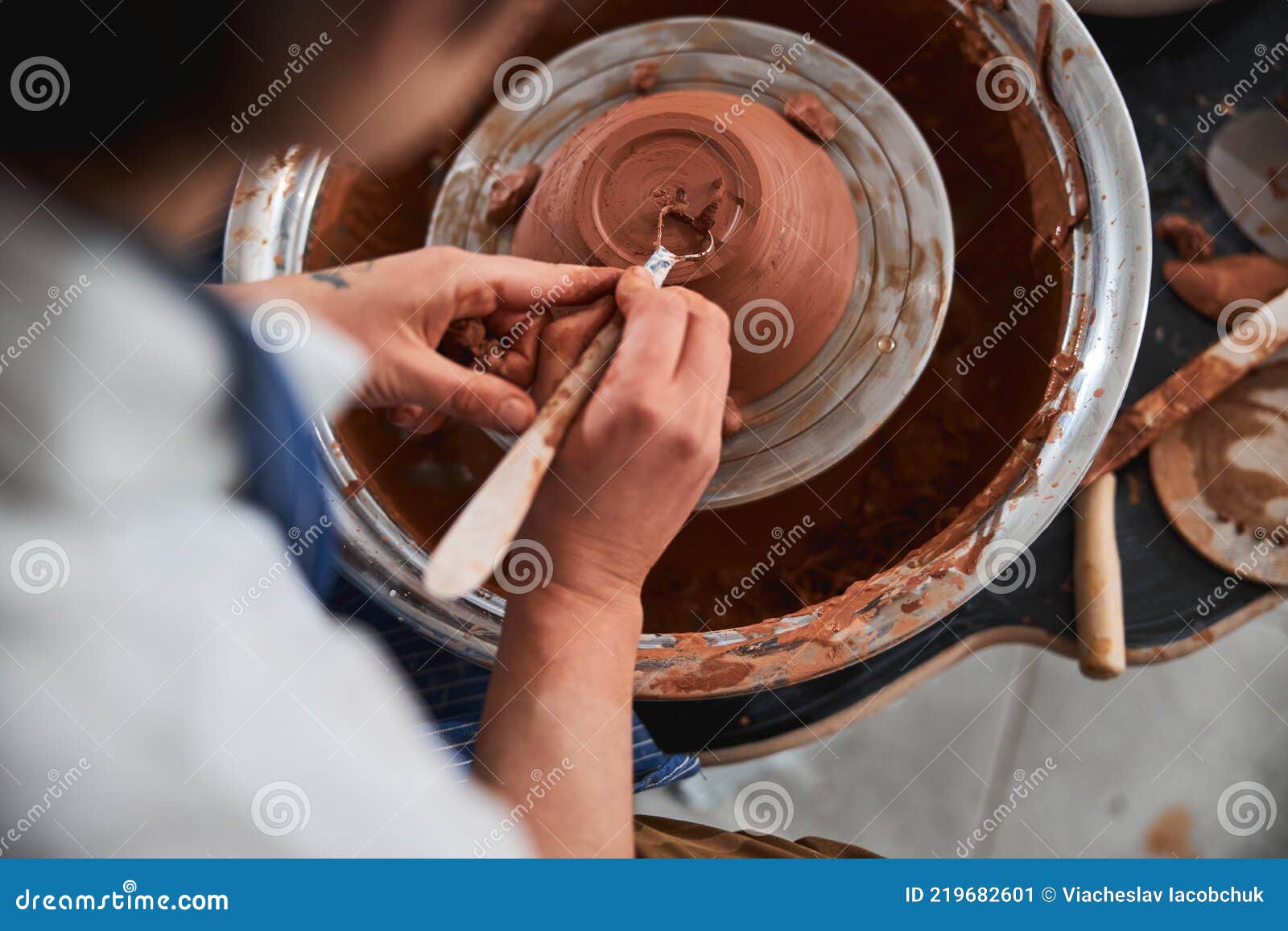 Loop Tool Taking Off Clay Slice from Bowl Bottom Stock Image - Image of ...