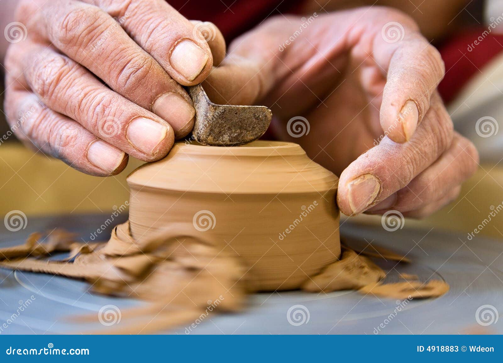 Potter Shaping the Bottom of a Cup on a Spinning Stock Image - Image of ...