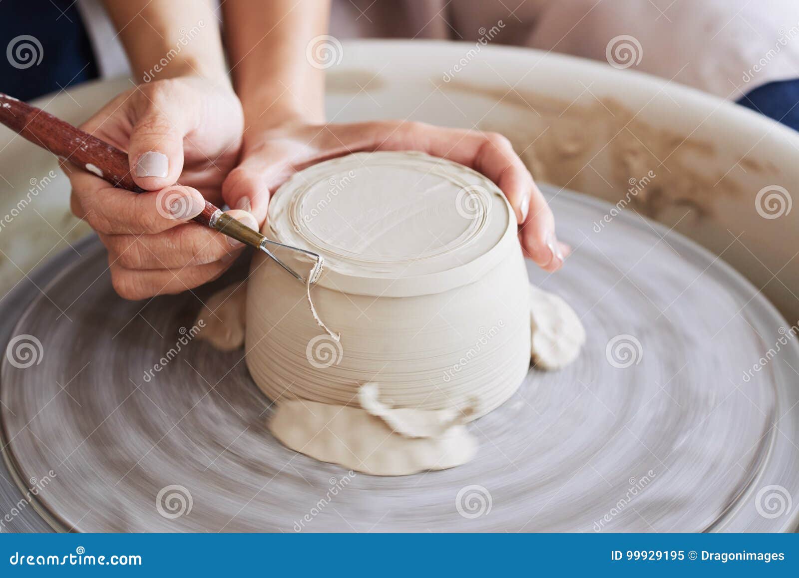 Trimming excess clay stock image. Image of class, instrument - 99929195