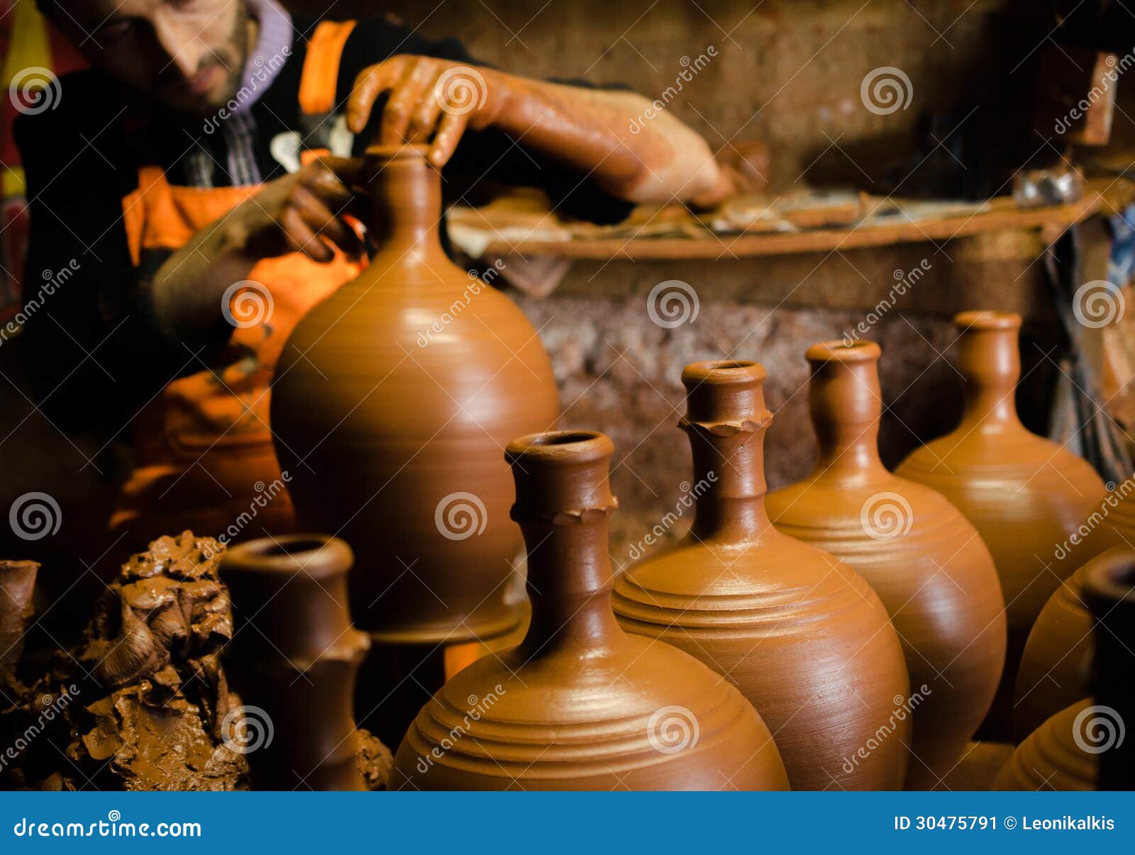 Potter working clay editorial photo. Image of occupation - 30475791