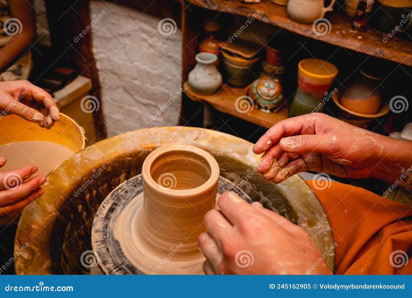 Potter Working on Potters Wheel with Clay. Process of Making Ceramic ...