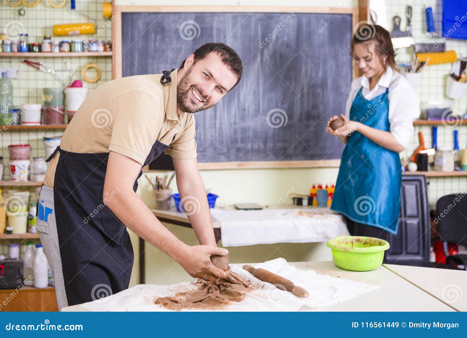 Pottering and Claymaking Process Concept. Two Professional Ceramists or ...